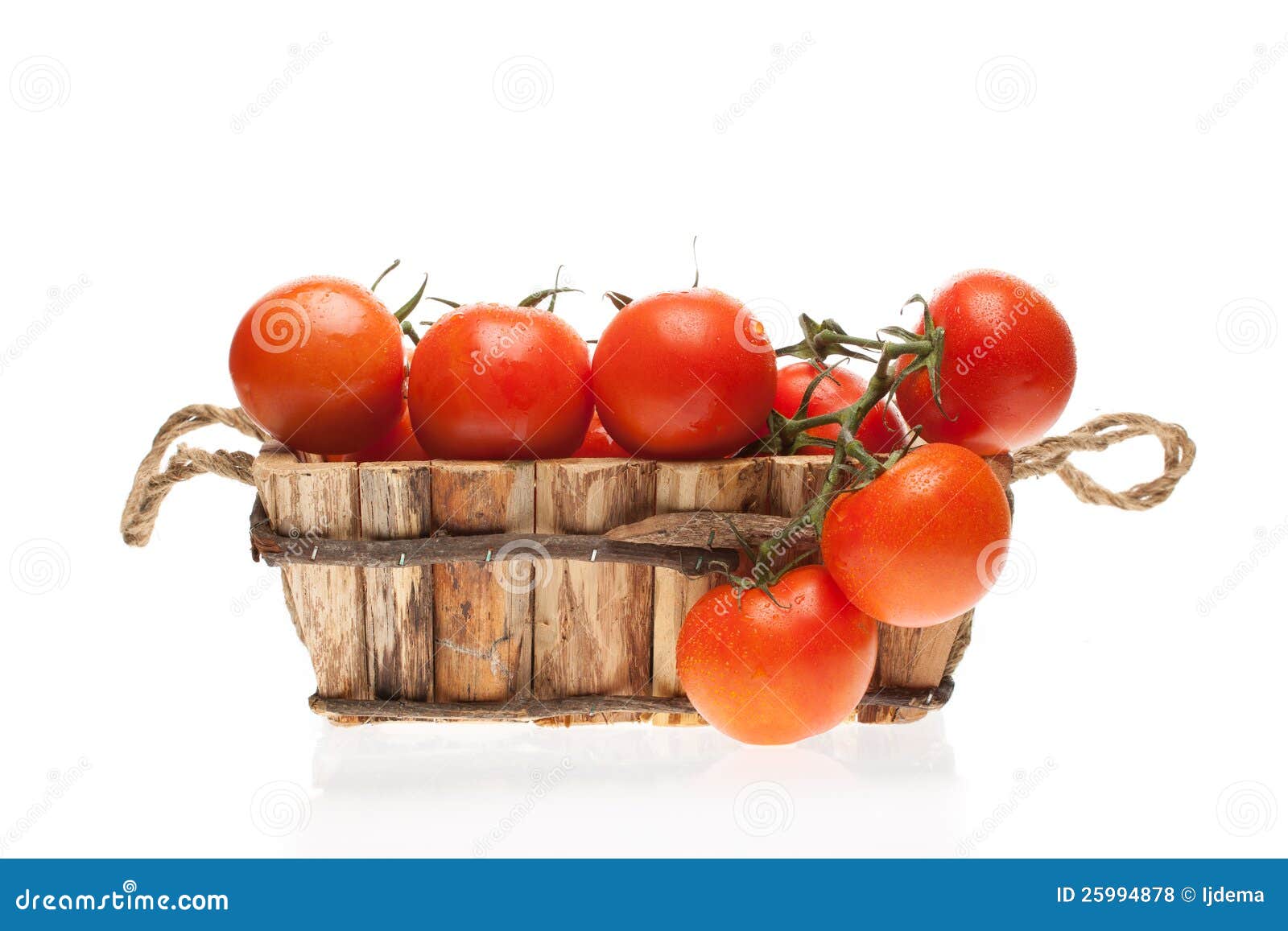 Fresh Tomatoes on a Vine in a Wooden Basket Stock Photo - Image of ...