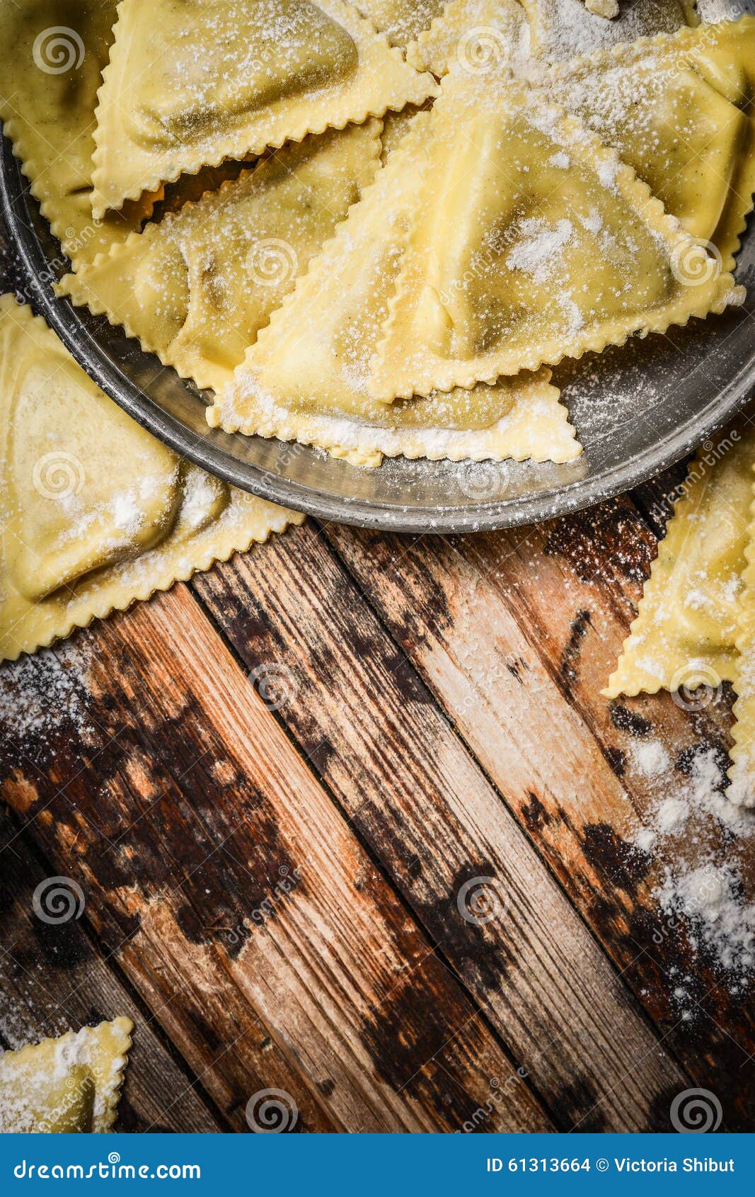 Fresh Triangular Ravioli in Metal Bowl on Rustic Wooden Background, Top ...
