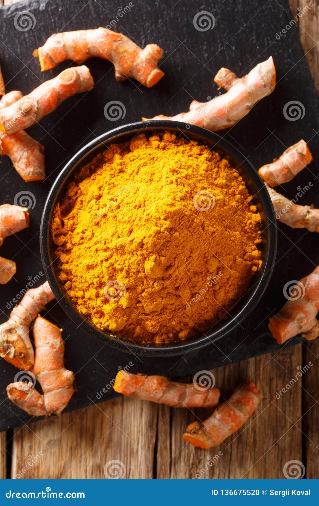 Fresh Turmeric Spice in a Bowl and Root Close-up. Vertical Top View ...