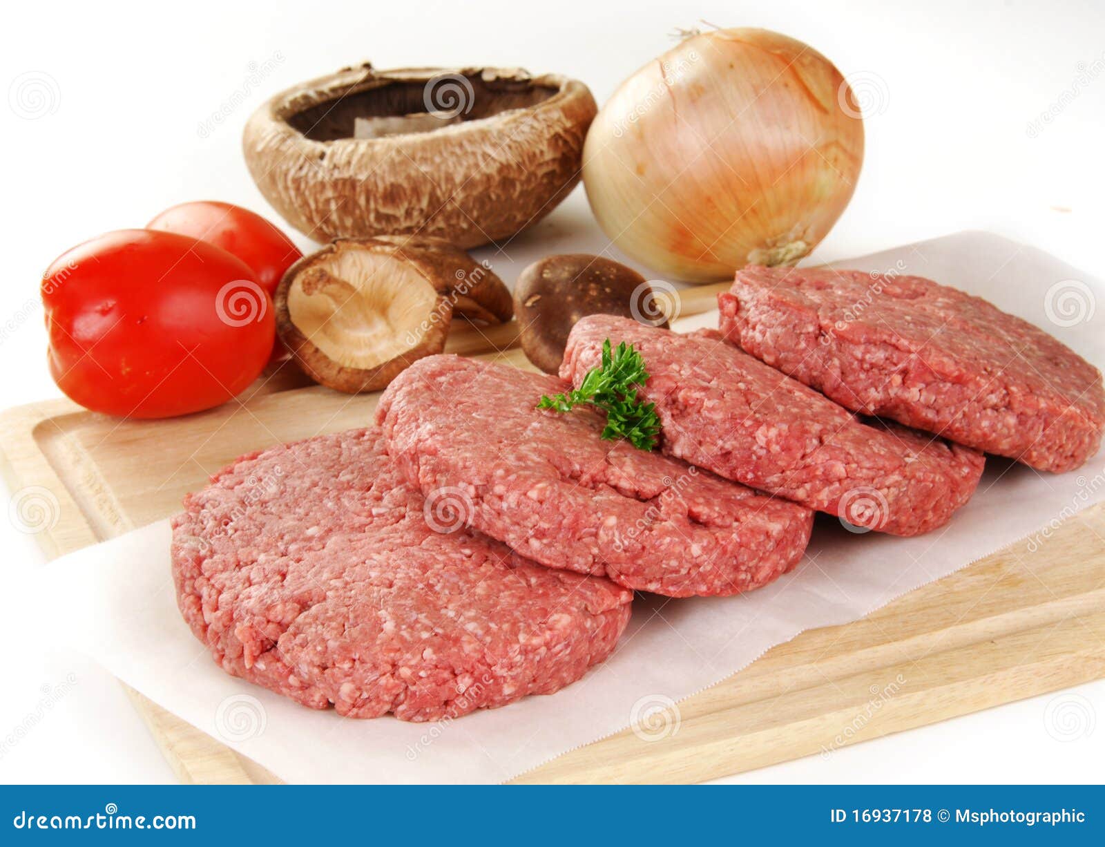 Fresh Uncooked Hamburger Patties Stock Photo - Image of onion, protien ...