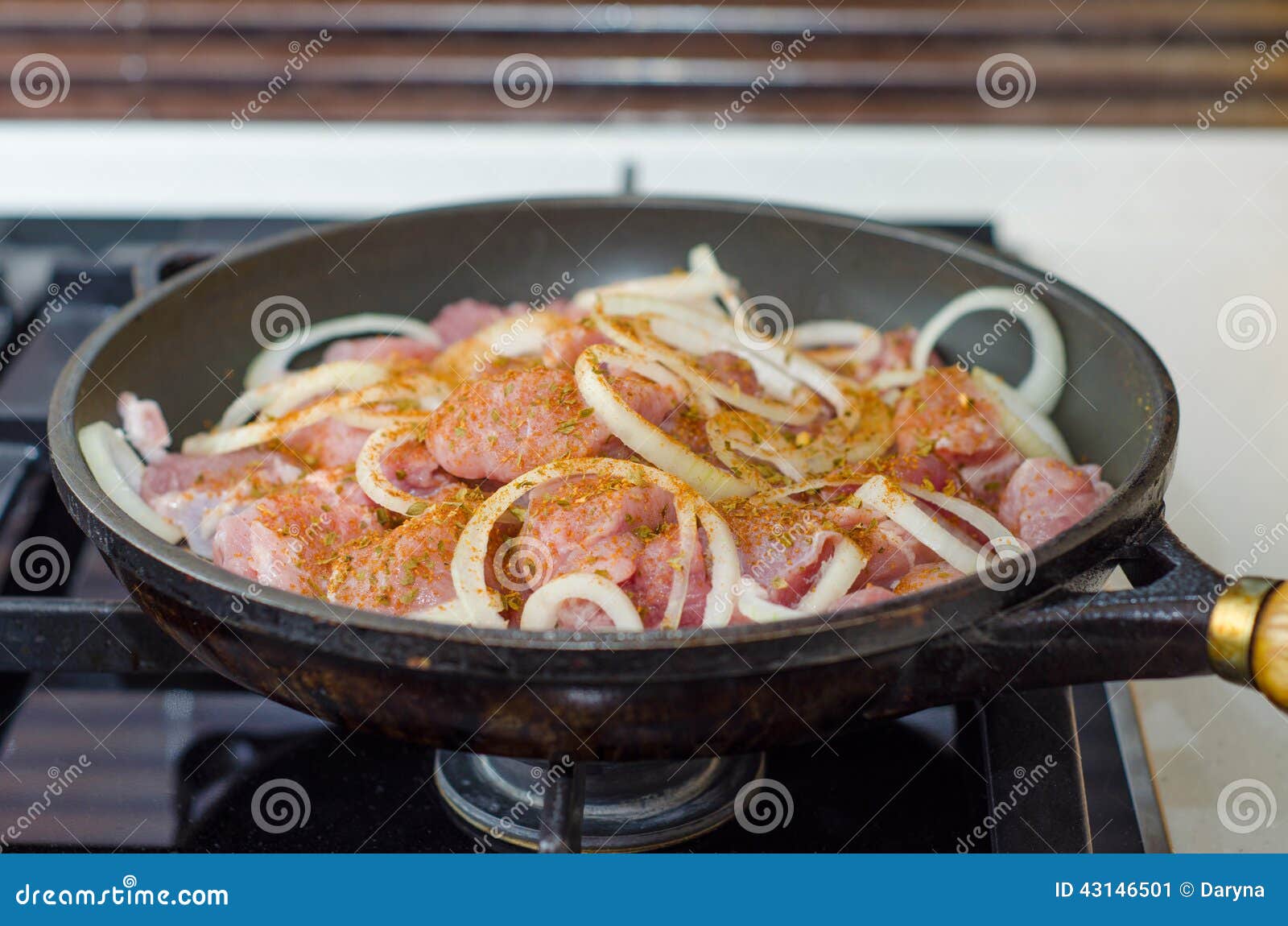 Fresh Uncooked Meat In Frying Pan On Metal Gas Cooker Stock Image Image Of Haft Basil 43146501