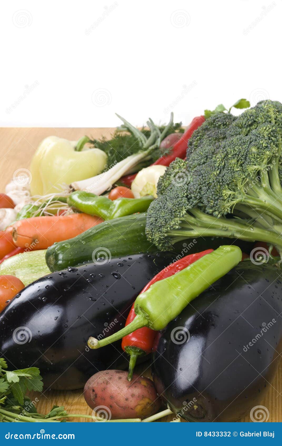 Pile of Fresh Vegetables on Cutting Board Stock Photo - Image of drops ...
