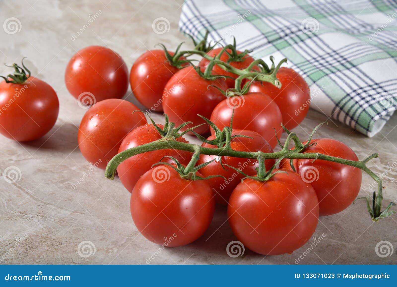 Fresh vine ripe tomatoes stock image. Image of towel - 133071023
