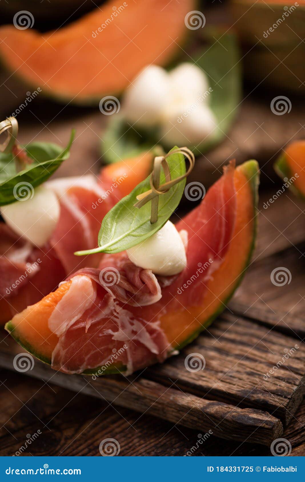 Fresh Water Melon with Parma Ham, Basil and Cherry Mozzarella Stock ...