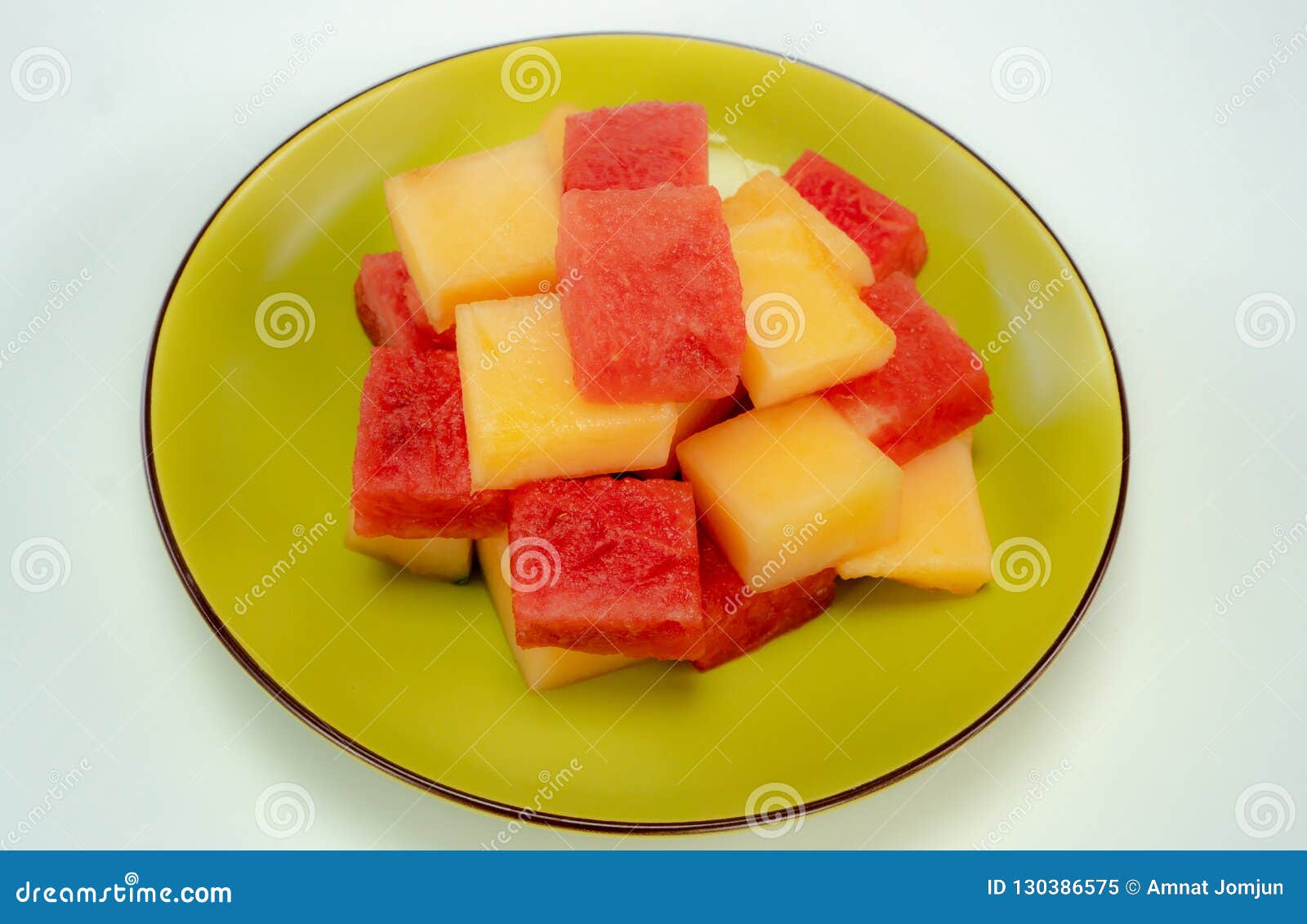 Fresh Watermelons and Melons on a Green Plate Stock Image - Image of ...