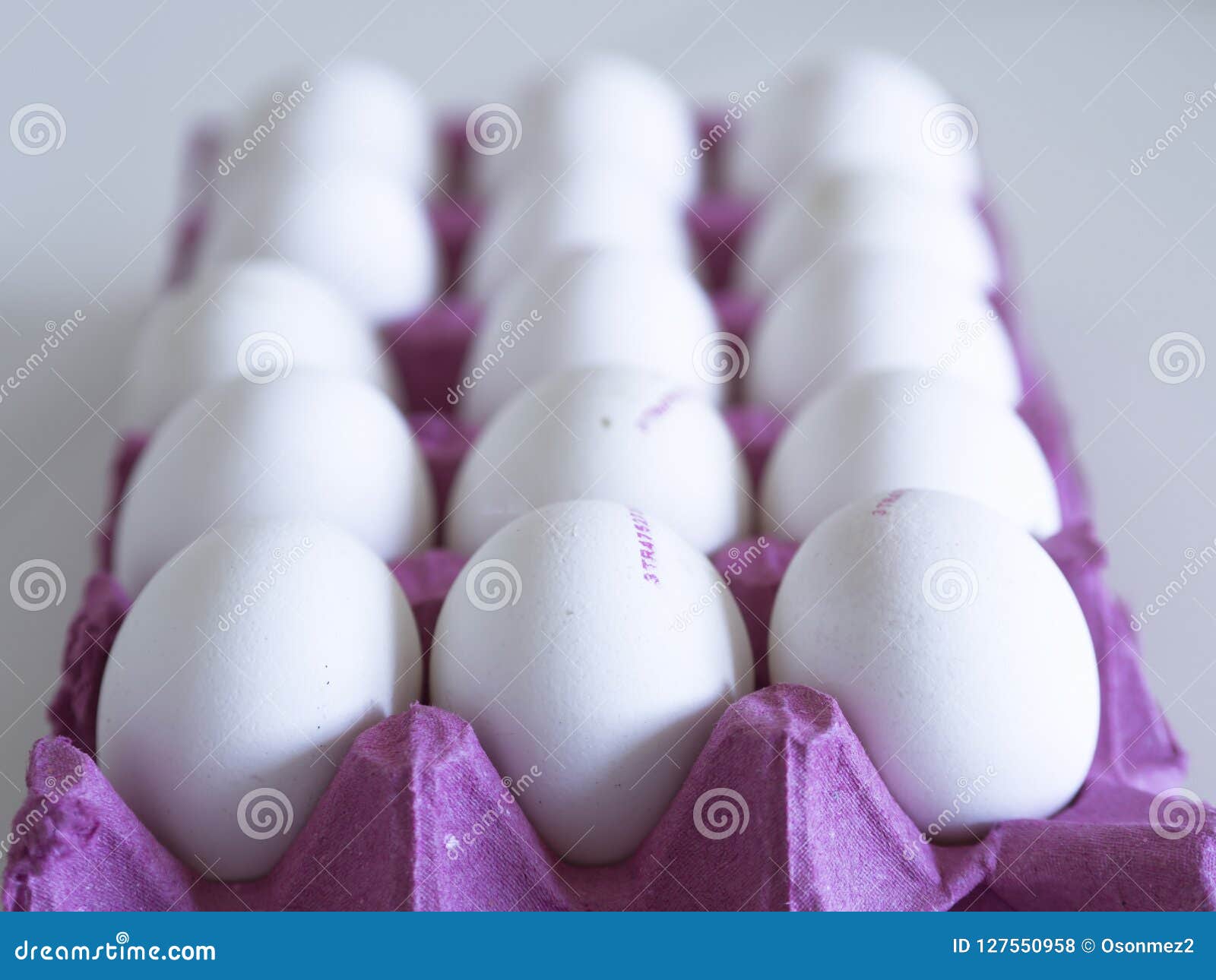 Fresh White Eggs with Barcode Numbers on Red Egg Case Stock Photo ...