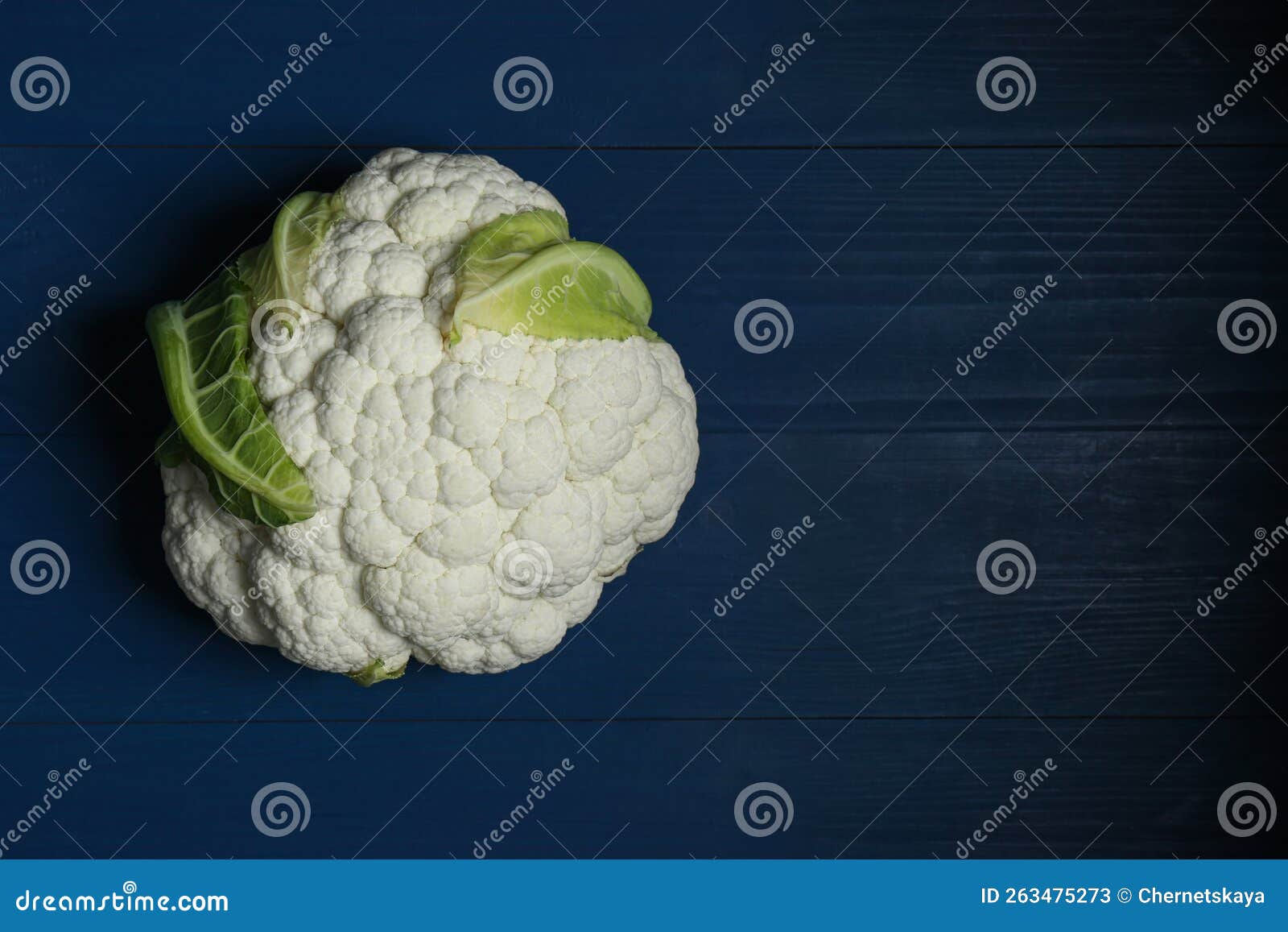 Fresh Whole Cauliflower on Blue Wooden Table, Top View. Space for Text ...