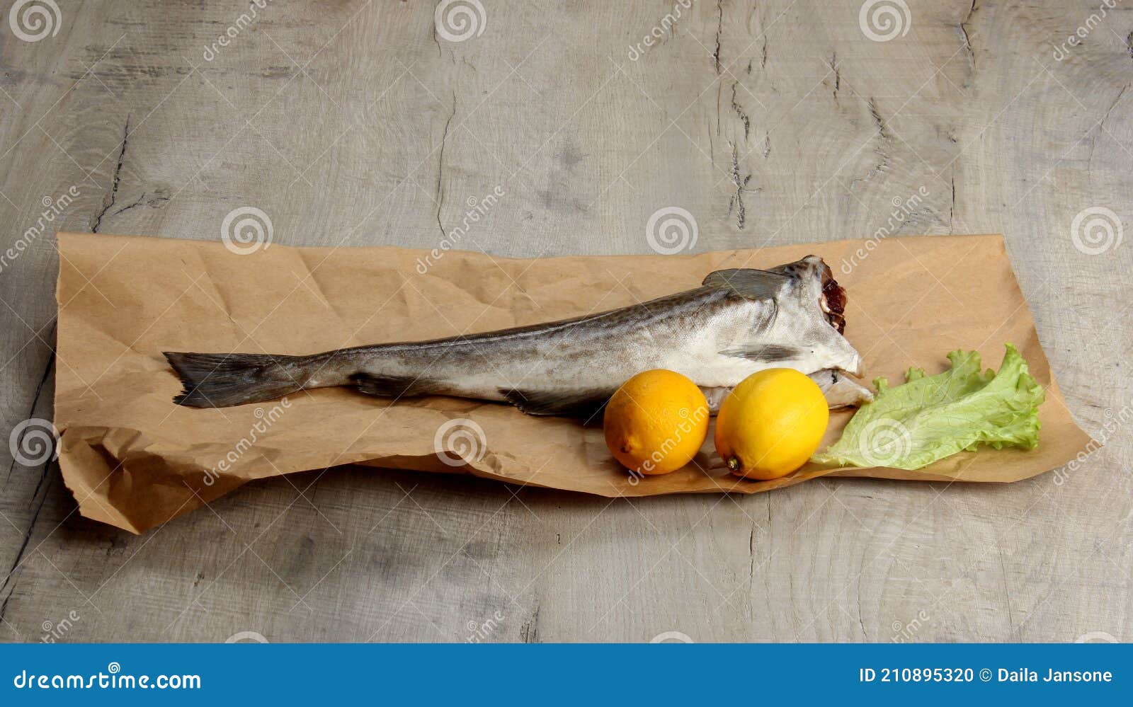 Fresh Whole Cod without a Head on a Sheet of Paper Stock Photo - Image ...