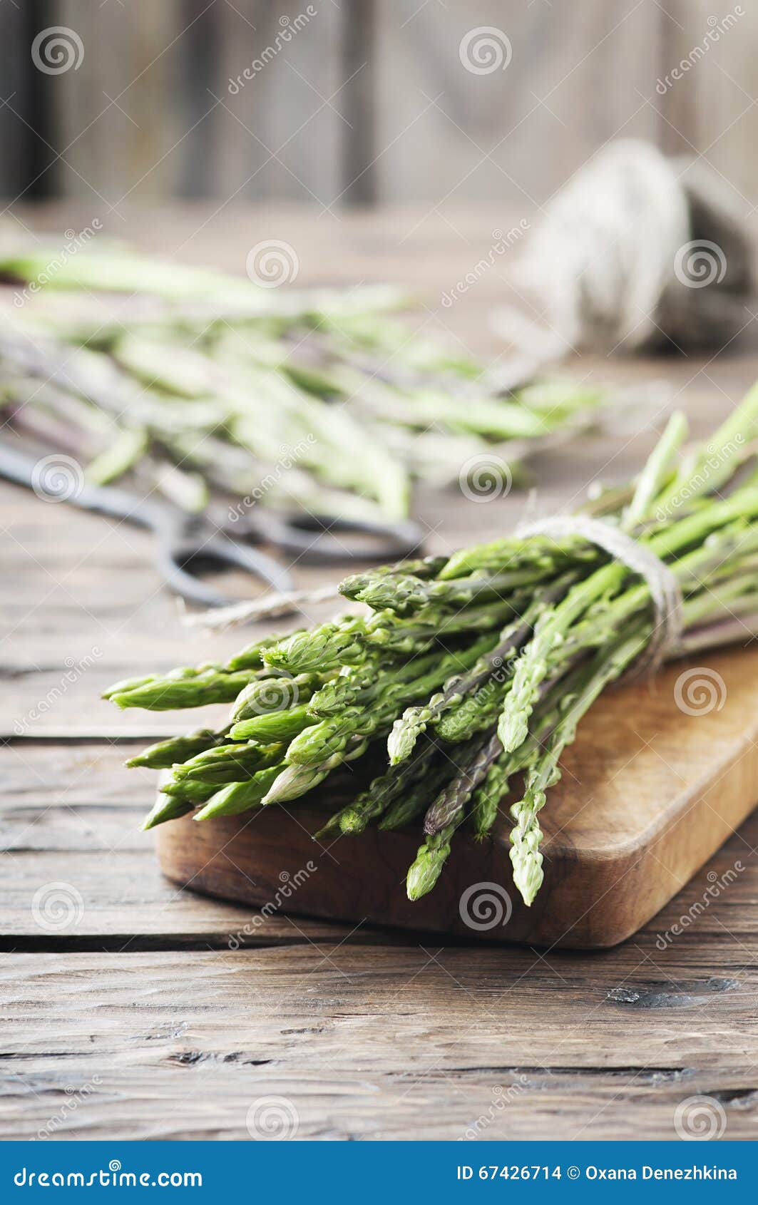 Fresh Wild Asparagus on the Wooden Table Stock Photo - Image of string ...