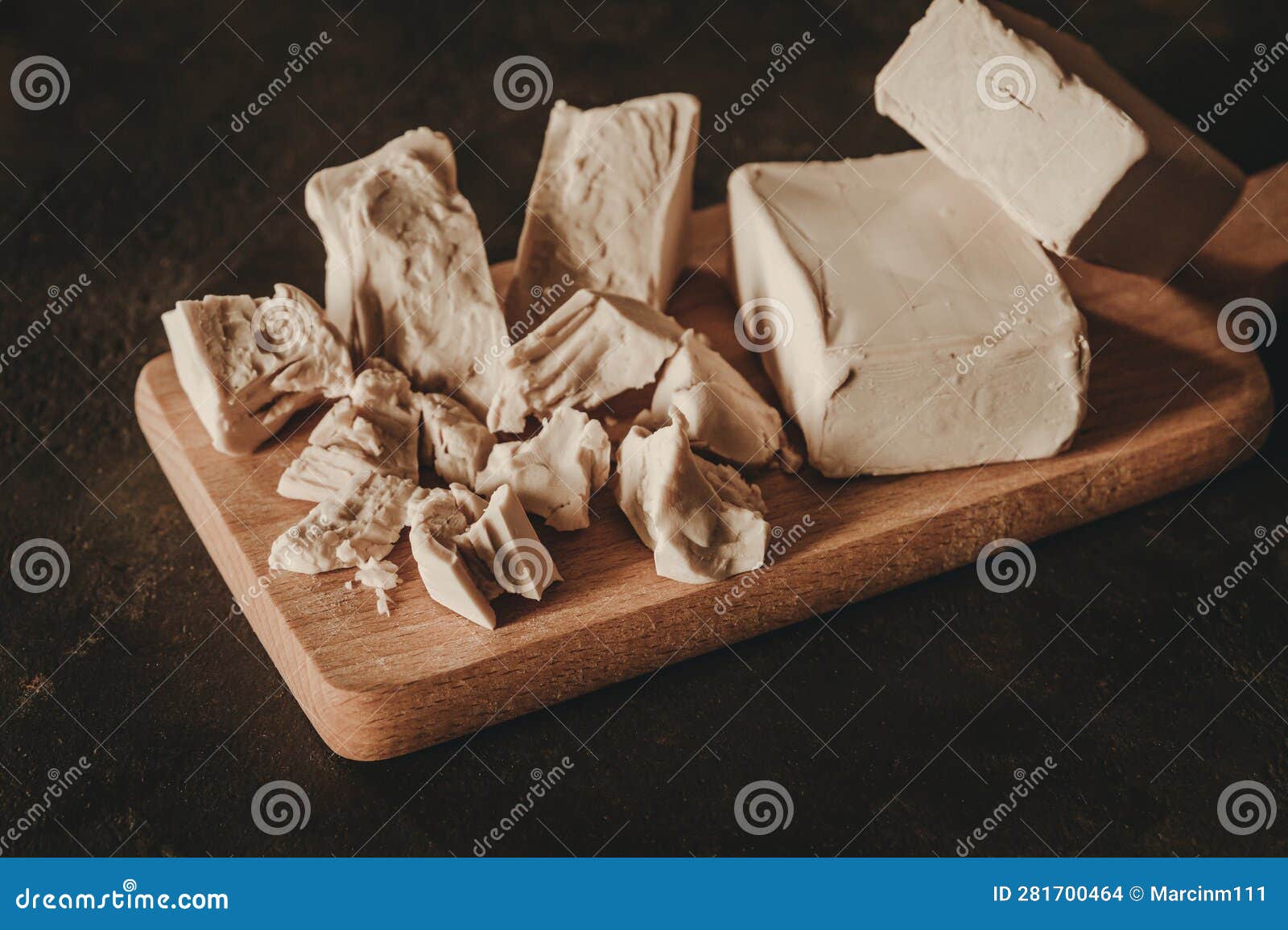 Fresh yeast in the kitchen stock photo. Image of chunks - 281700464