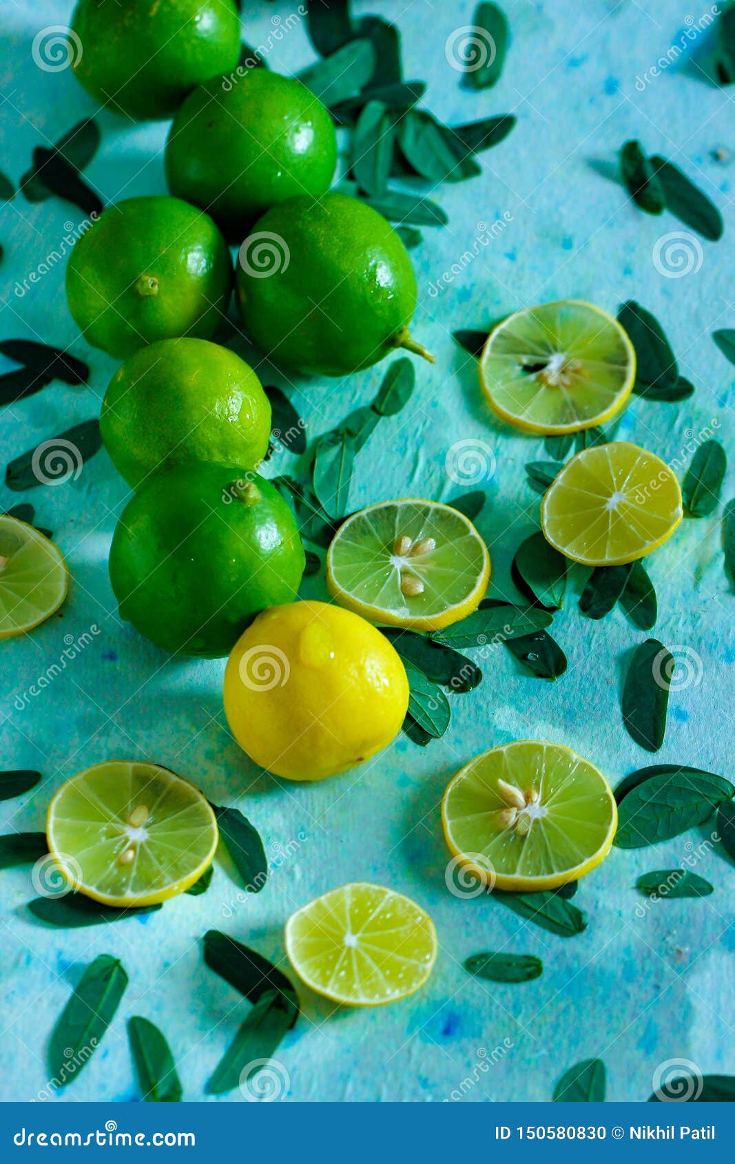 Fresh Yellow and Green Lemon on Blue Background Stock Photo - Image of ...