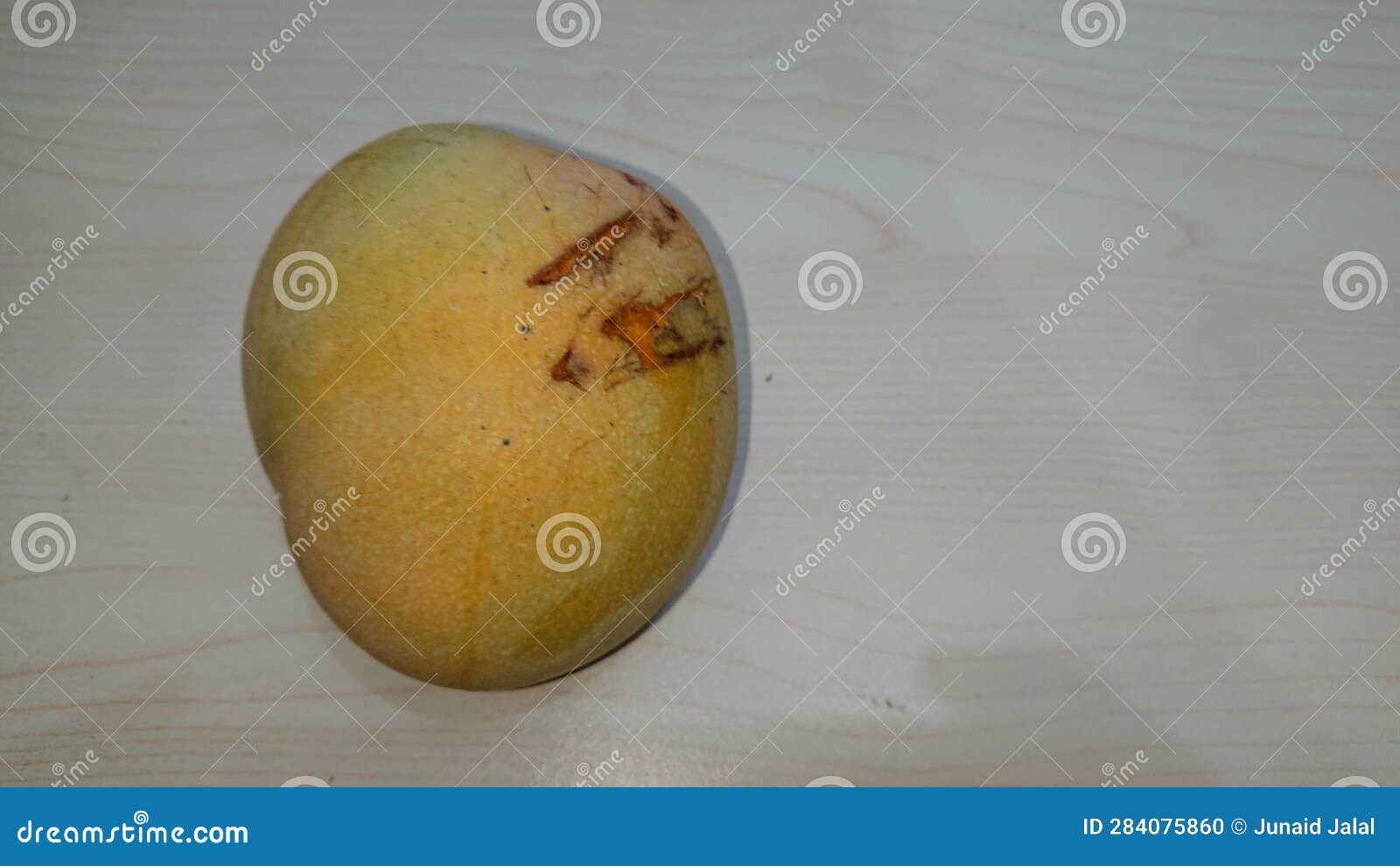 Fresh Yellow Mango with Tree Injuries: Undiminished Charisma Stock ...