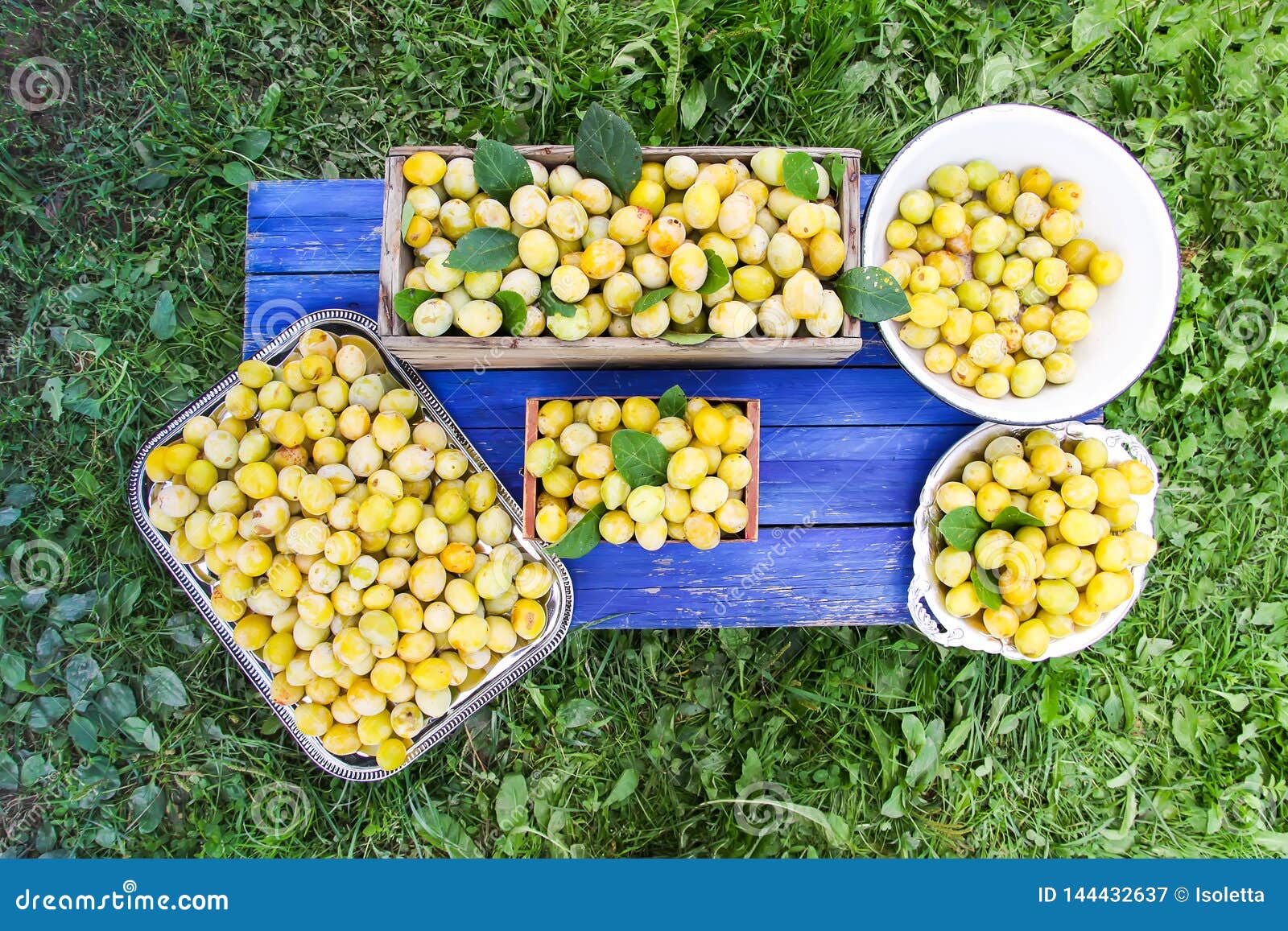 Fresh Yellow Plums in Containers on Wooden Boards Stock Image - Image ...