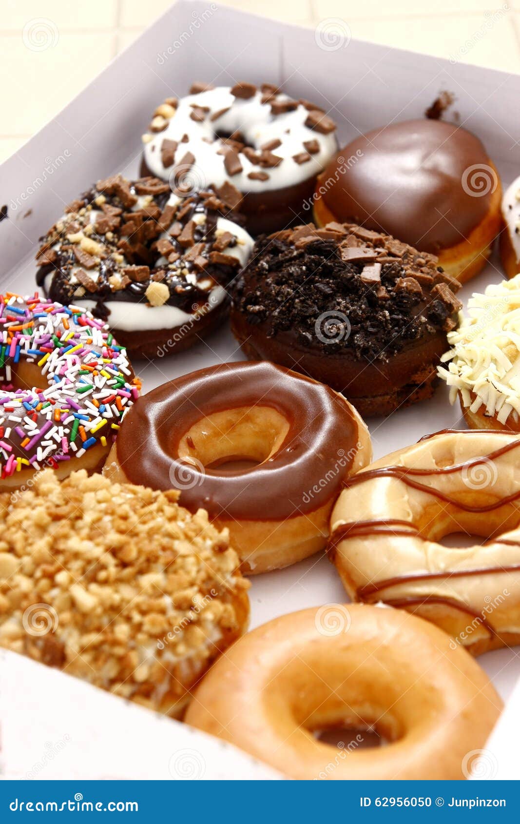 Freshly Baked Assorted Donuts Stock Photo - Image of pastry, lunch ...