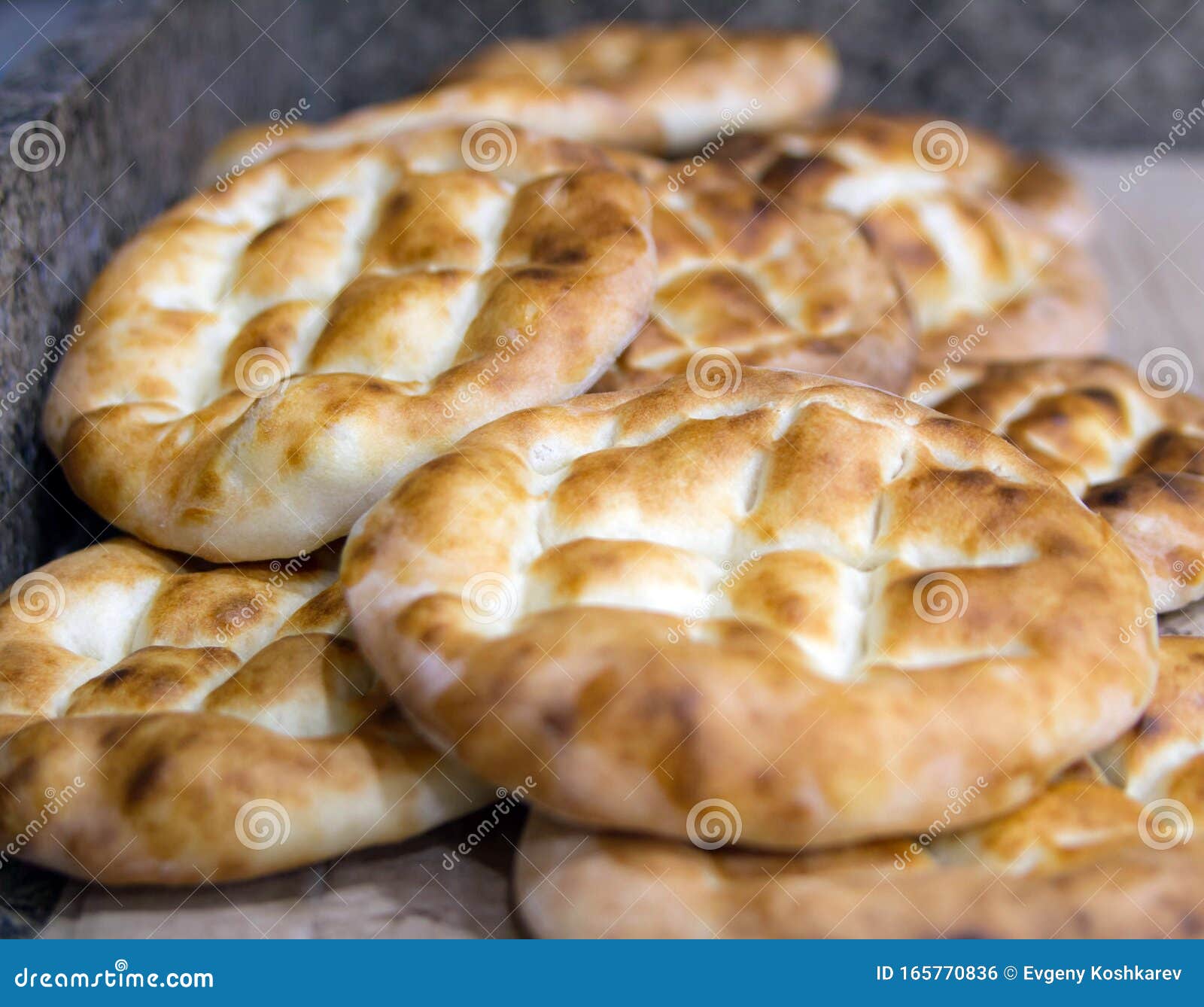 Freshly Baked Bread According To the Uzbek Recipe on the Bakery Table ...