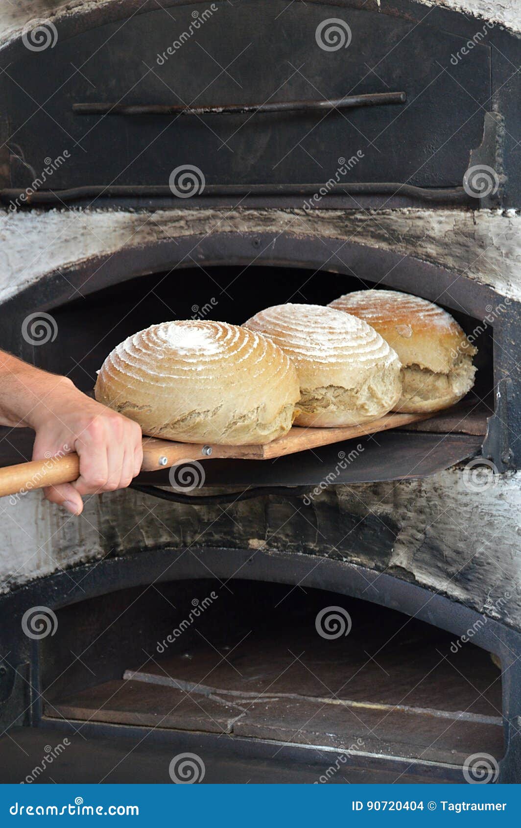 Freshly Baked Bread in Old Timey Wood Oven Stock Photo - Image of food ...