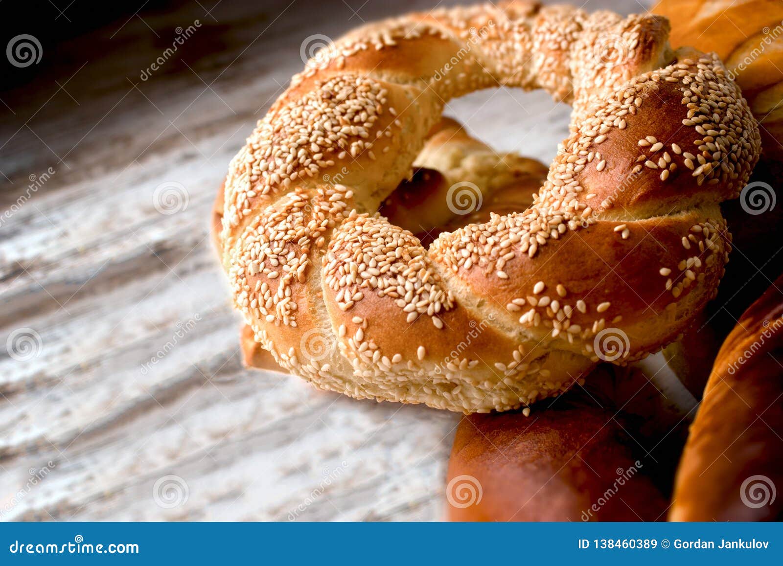 Freshly Baked Crispy Pretzel with Sesame on Rustic Table Stock Image ...