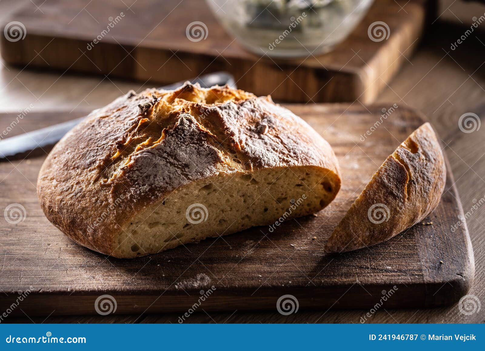 Freshly Baked Crusty Bread with Its First Slice Cut Off Stock Image ...