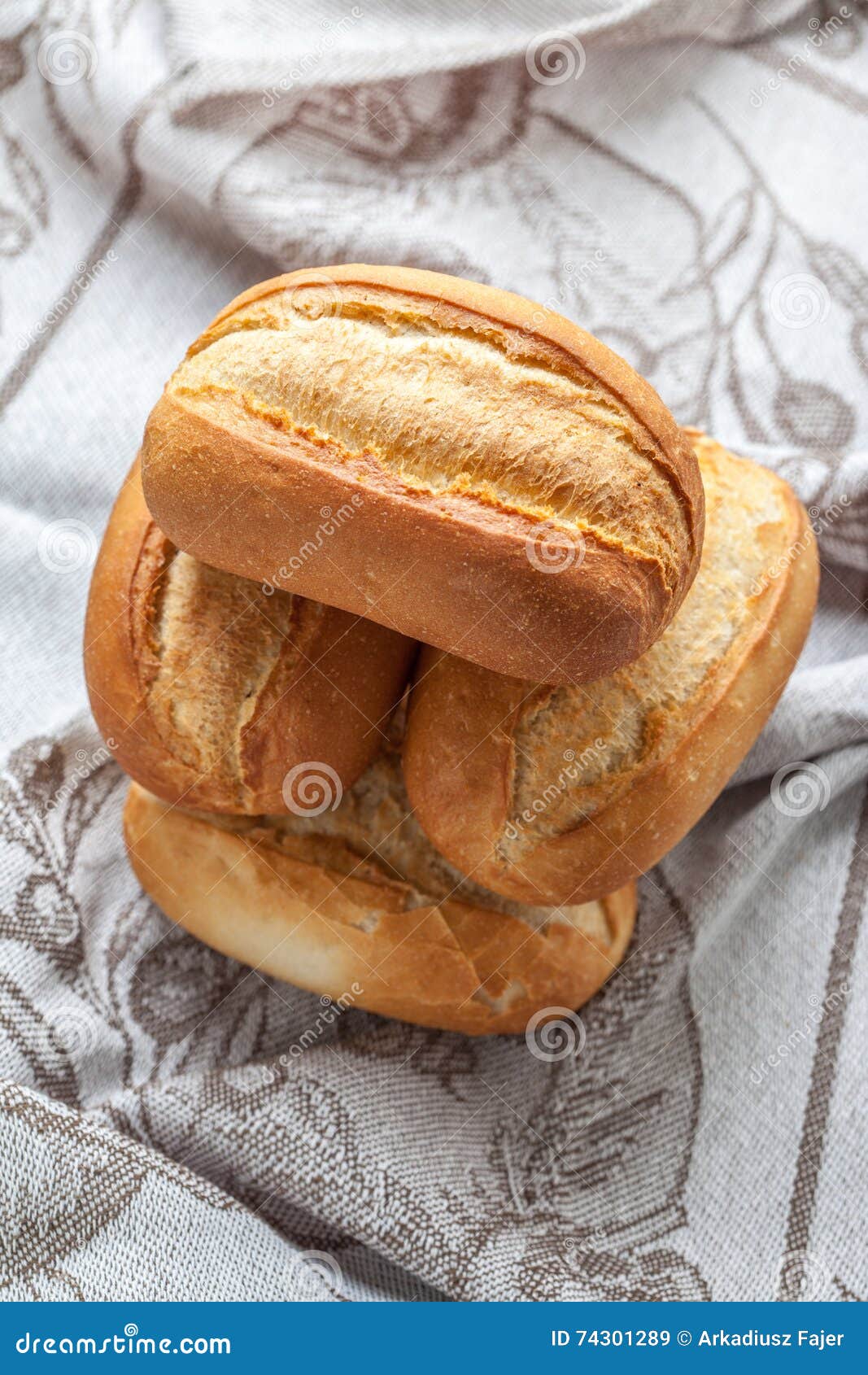 Freshly baked crusty rolls stock image. Image of baking - 74301289