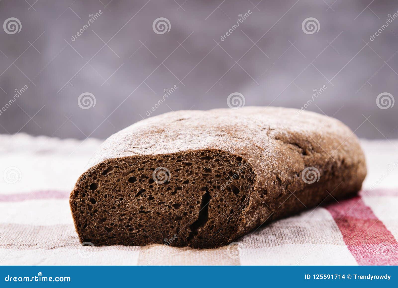 Freshly Baked Sliced Rye Bread on Rustic Tablecloth Stock Photo - Image ...