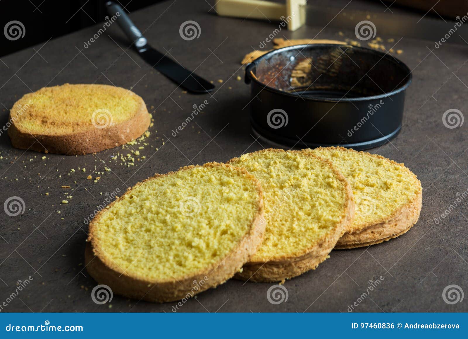 Freshly Baked Sponge Cake Cut into Four Layers, with Cake Baking Form ...