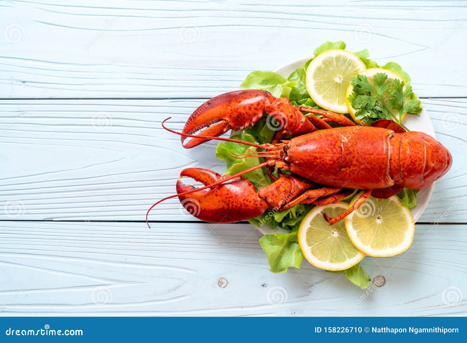 Boiled Lobster with Vegetable and Lemon Stock Photo - Image of claw ...