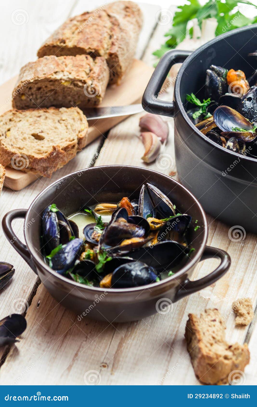 Freshly Cooked Mussels at Home and Served with Bread Stock Photo ...