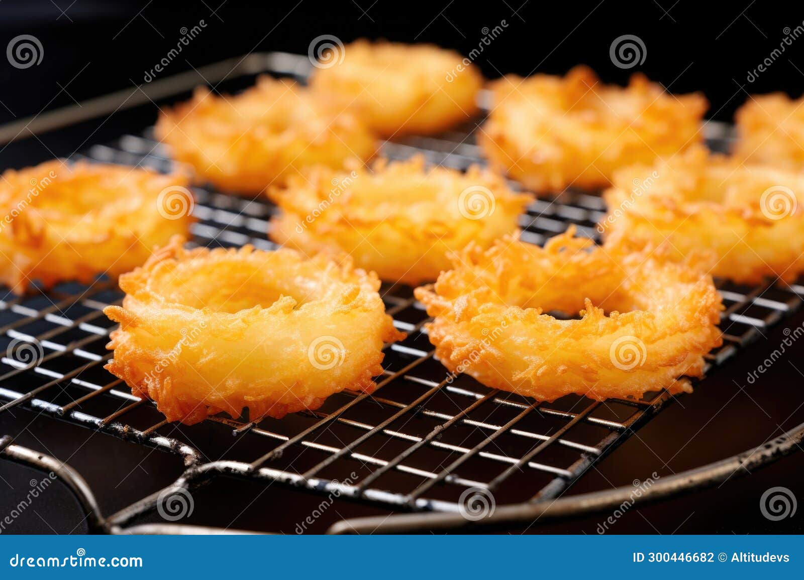 Freshly Cooked Onion Rings Cooling on Wire Rack Stock Photo - Image of ...