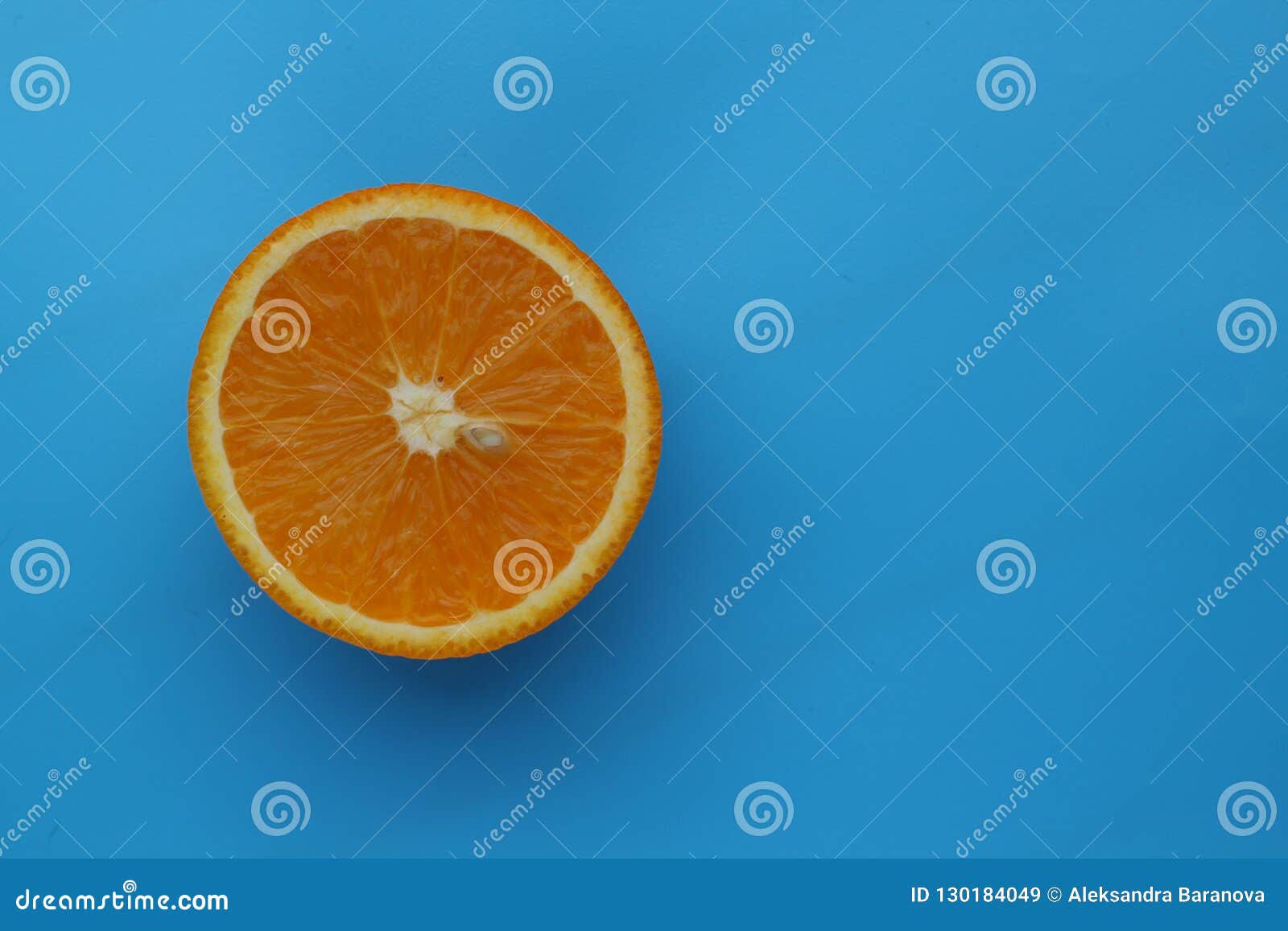 Top View of Freshly Cut Half Orange on Blue Background Stock Image ...