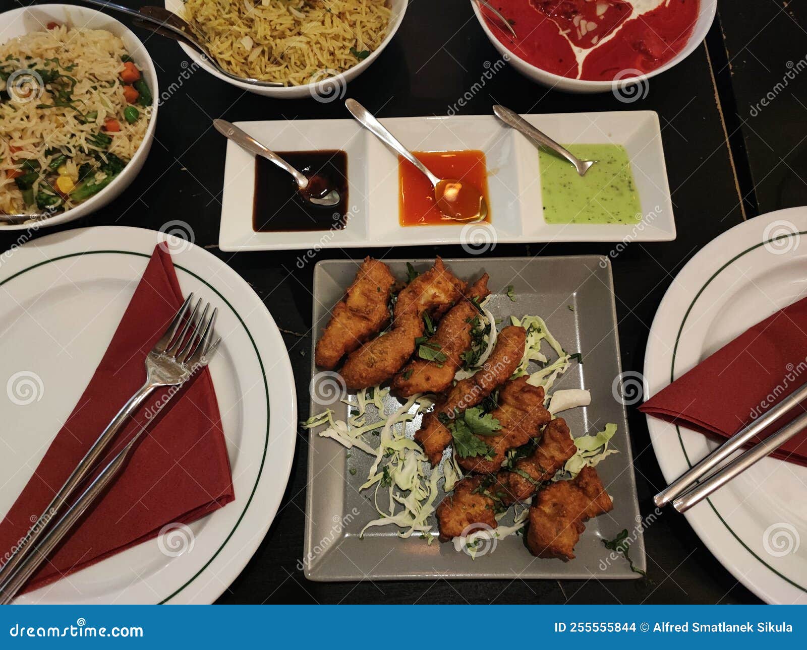 Fried Chicken Breasts on a Plate with Props on the Black Table Stock ...