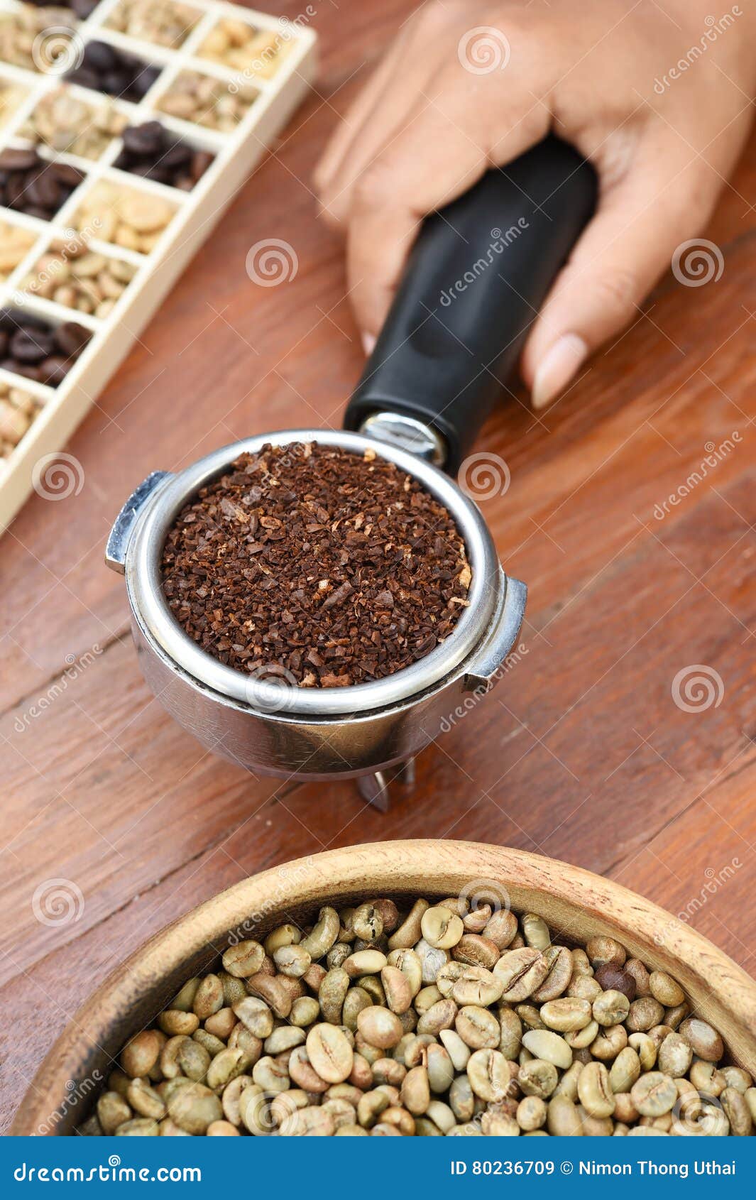 Freshly Ground Coffee Beans in a Metal Filter and Coffee Beans Stock ...