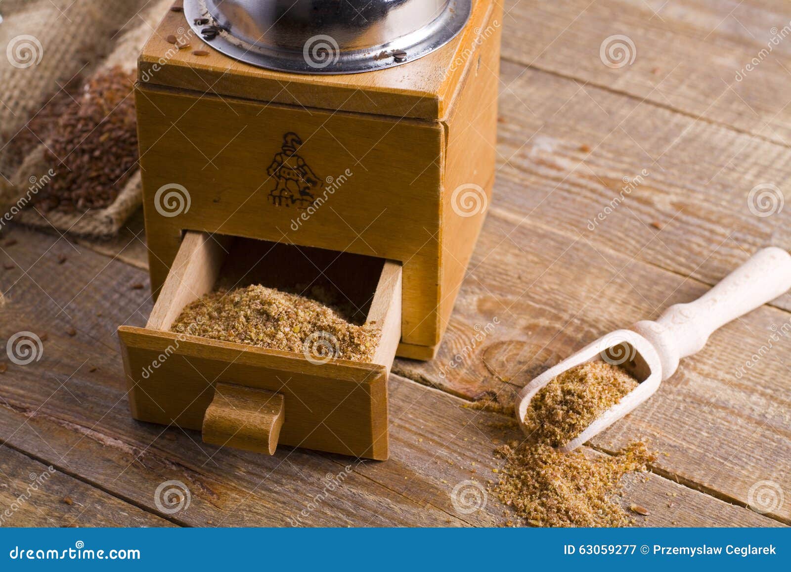Freshly Ground Linseed. Manual Mill Stock Image - Image of grain ...