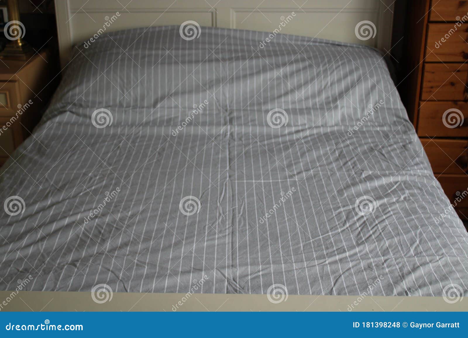 Freshly made bed stock photo. Image of duvet, bedding - 181398248