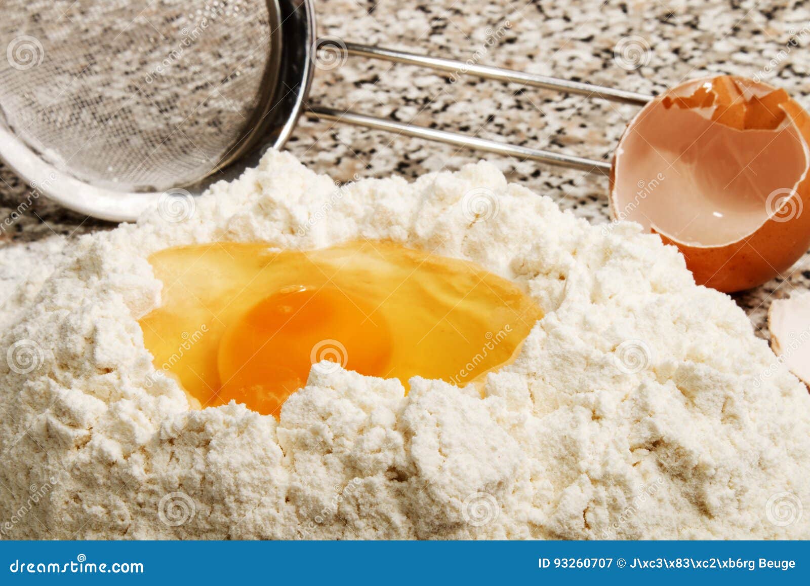 Freshly Opened Egg in Flour and Sieve in the Background Stock Image ...