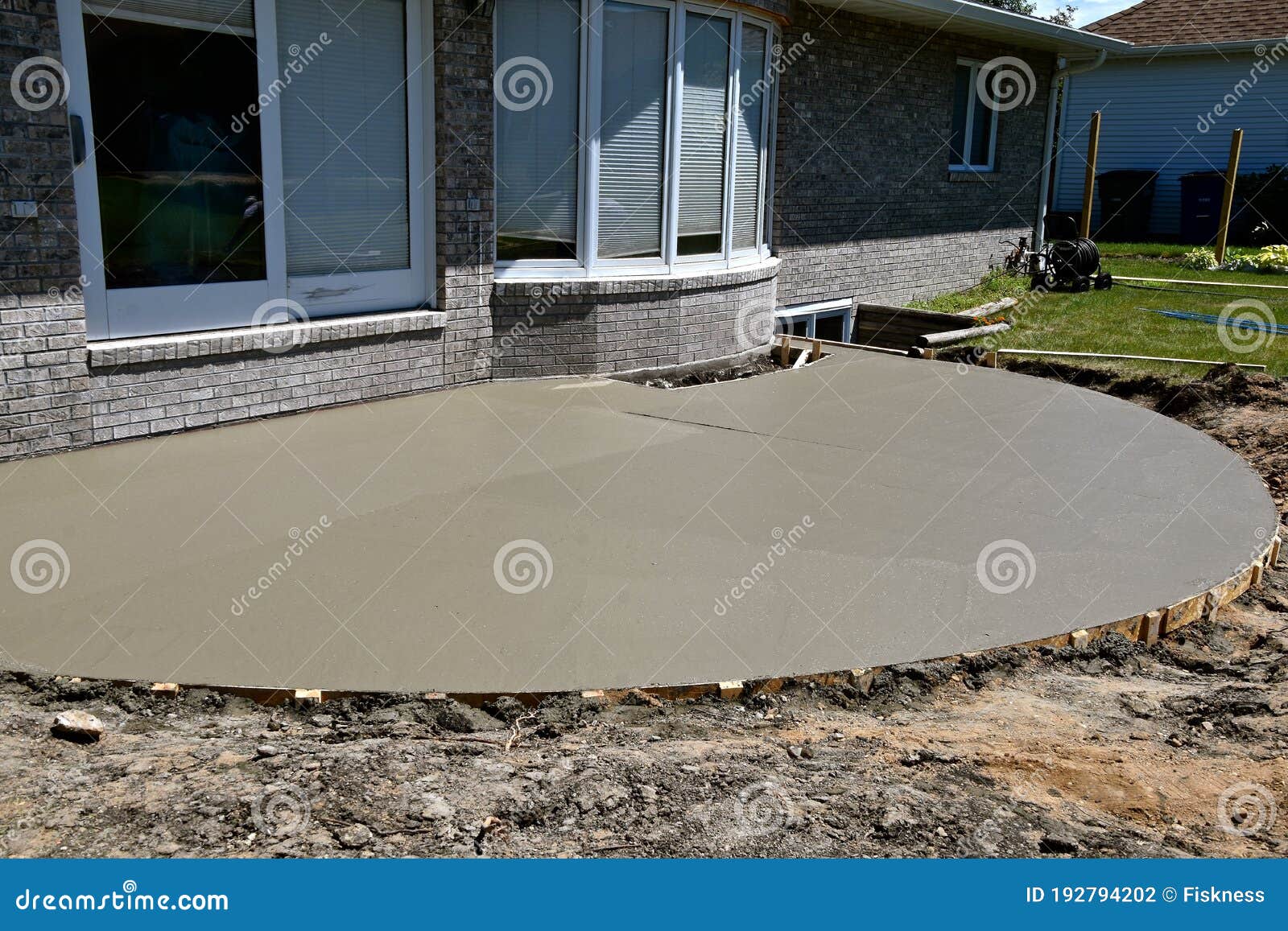 Freshly Poured Concrete Outside Patio Stock Photo - Image of leveling ...