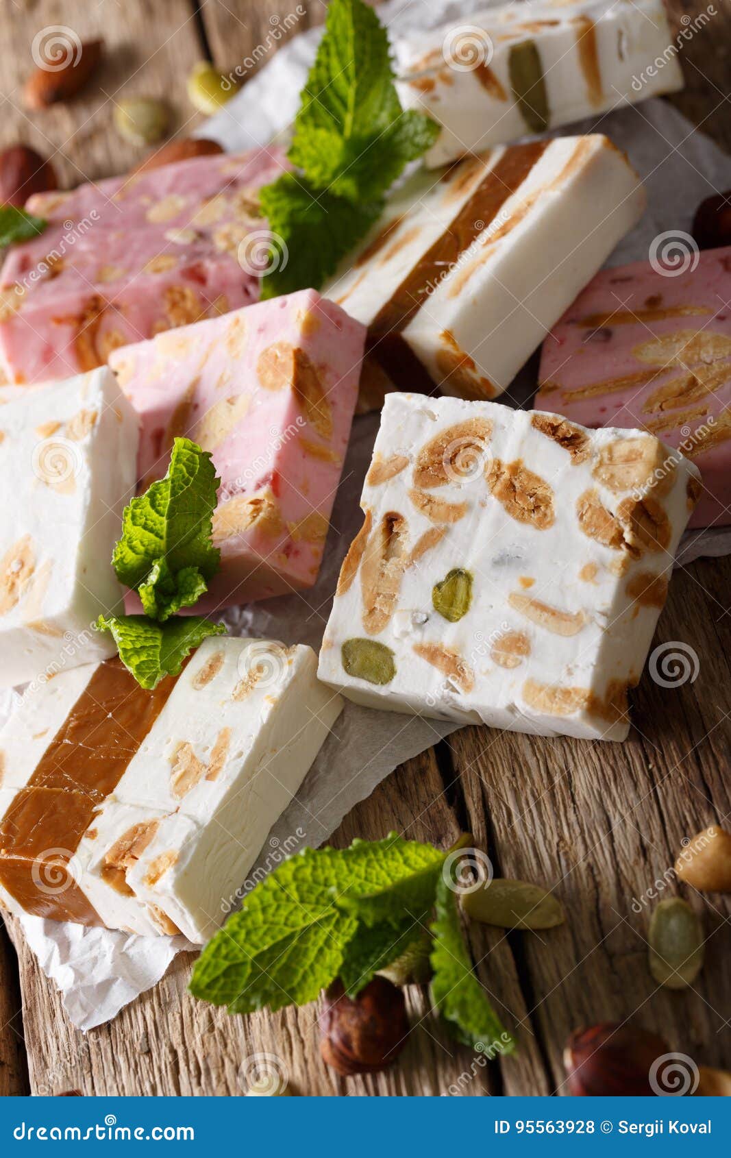 Freshly Prepared Honey Nougat with Nuts Close-up. Vertical Stock Photo ...