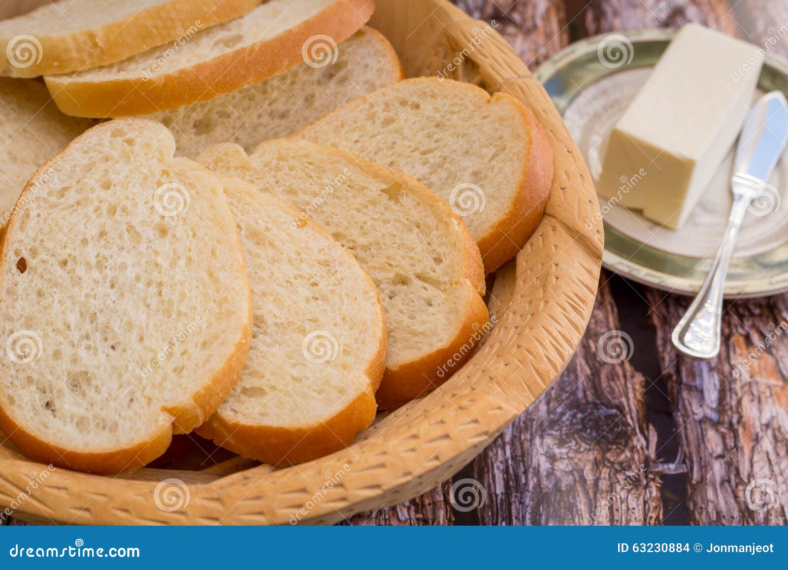 Freshly Sliced Bread Platter with Butter. Stock Photo - Image of fresh ...