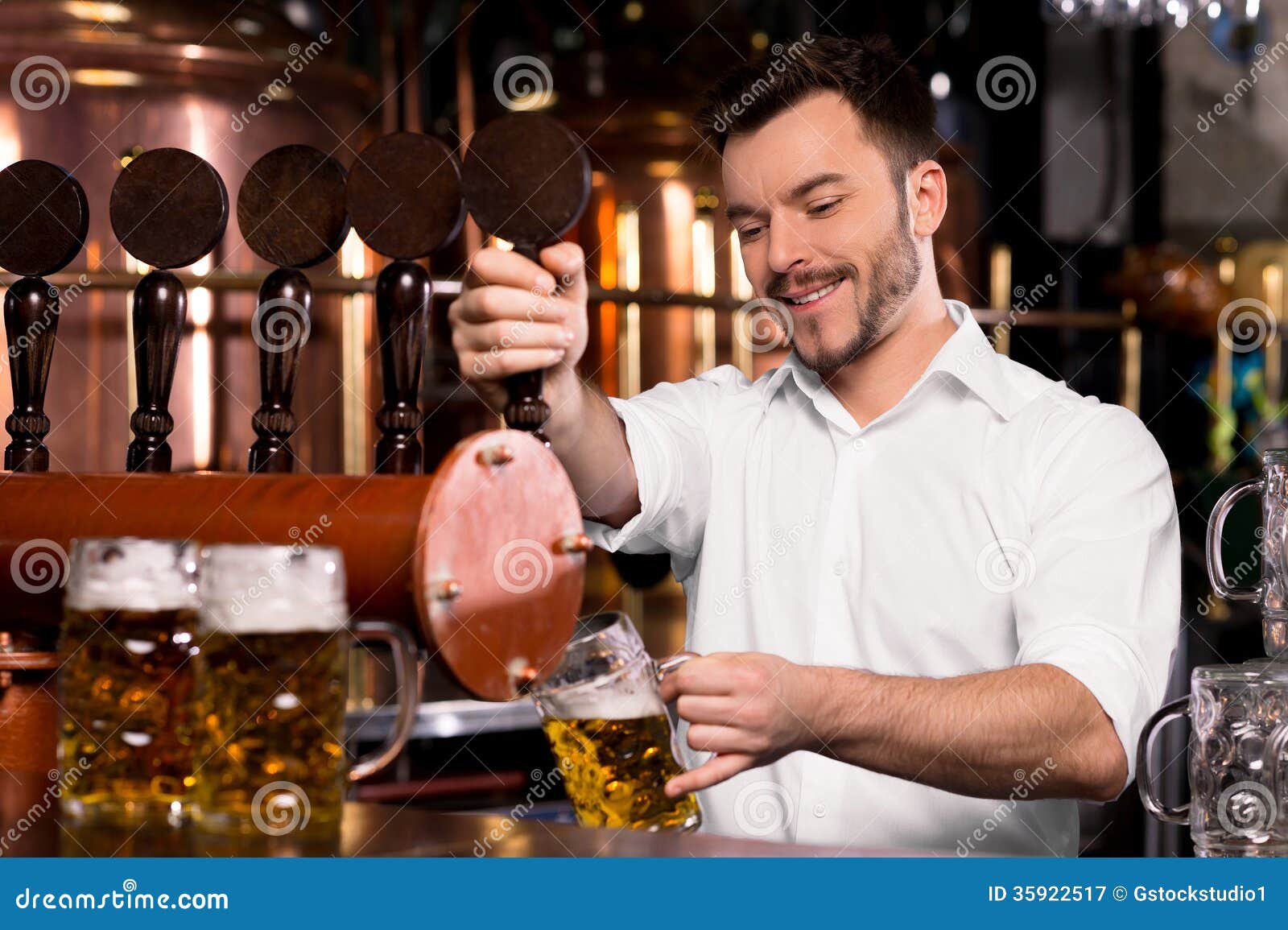 Freshly tapped beer. stock image. Image of alcohol, froth - 35922517