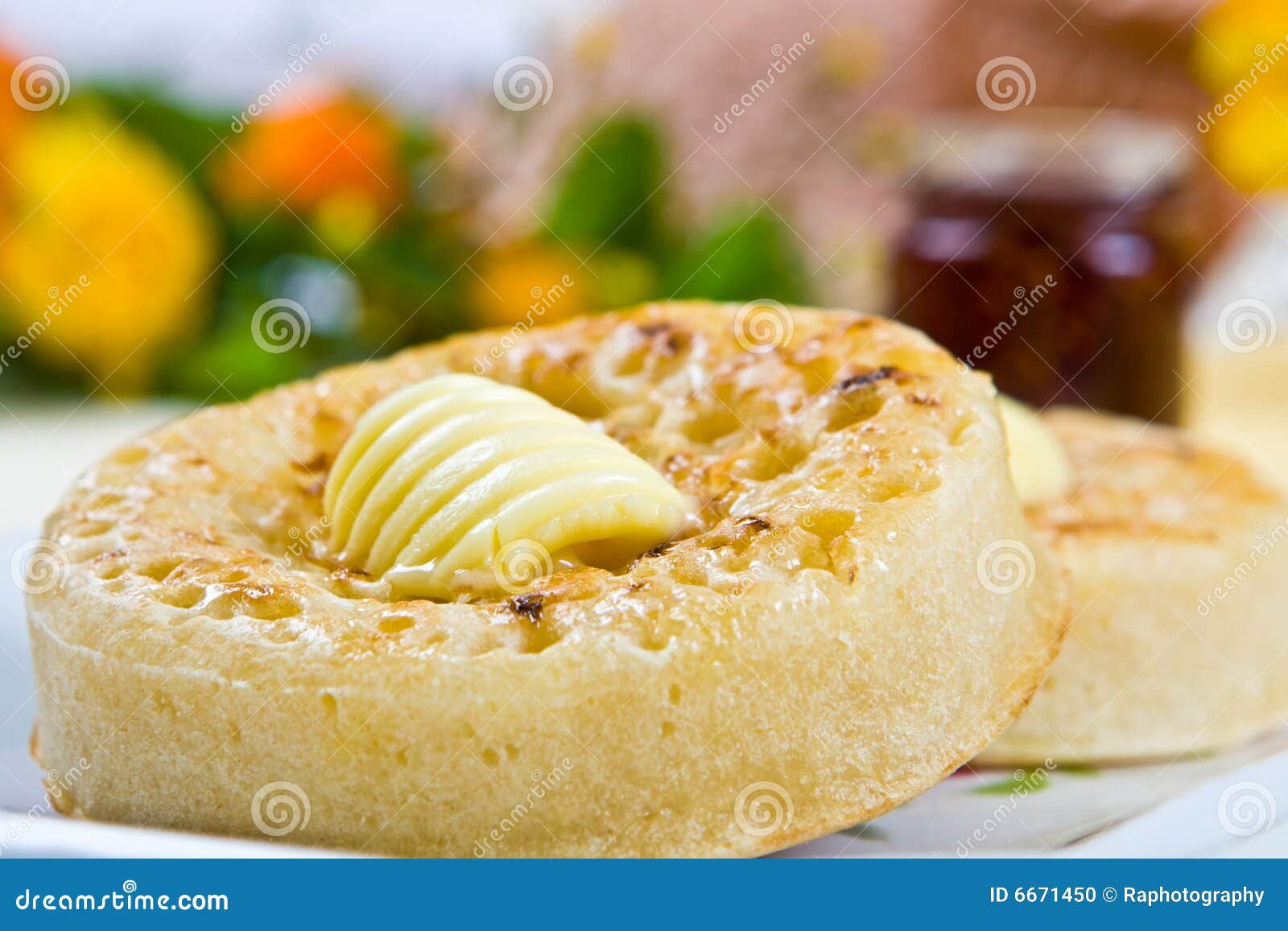 Freshly Toasted Crumpet with Melting Butter Stock Photo - Image of ...