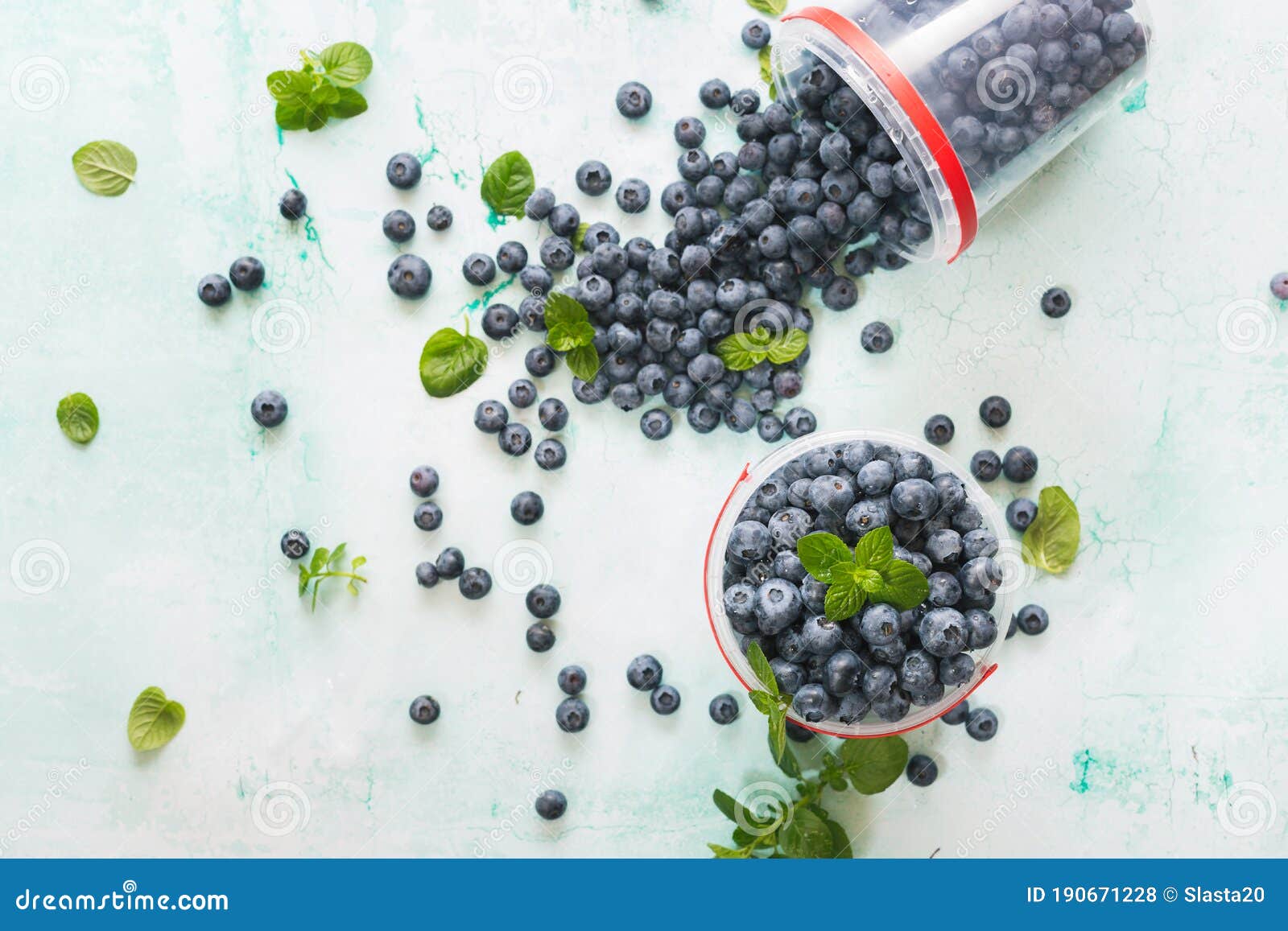 Freshly Washed Blueberries with Plastic Beaker on Rustic Surface Stock ...