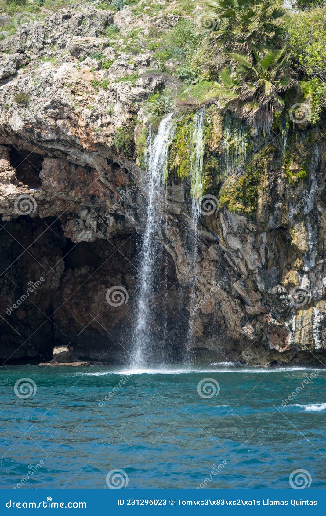Freshwater Waterfall Falling on the Shores of the Mediterranean between ...