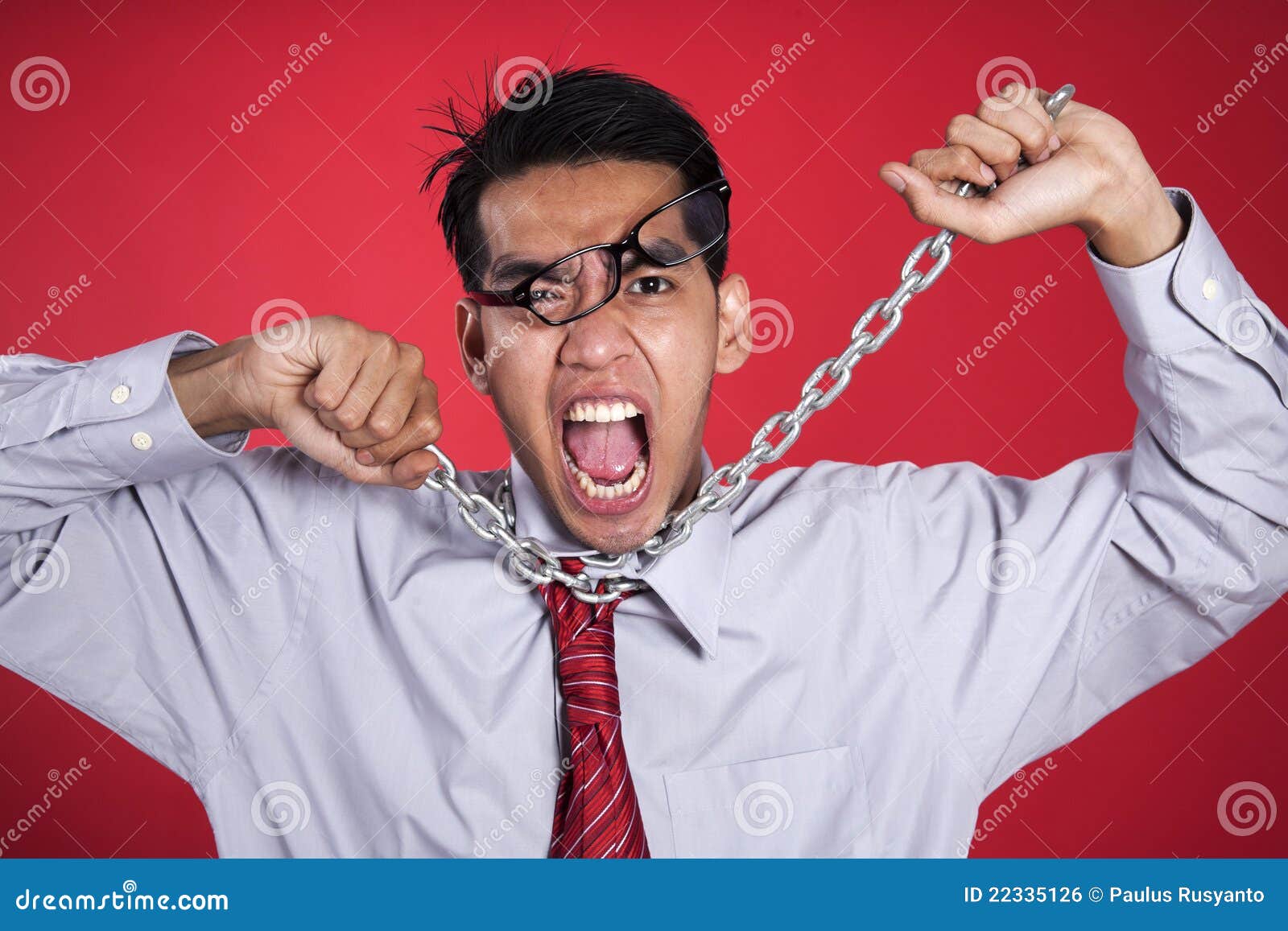 Freustrated Businessman with Chain Shot Over Red Stock Photo - Image of ...
