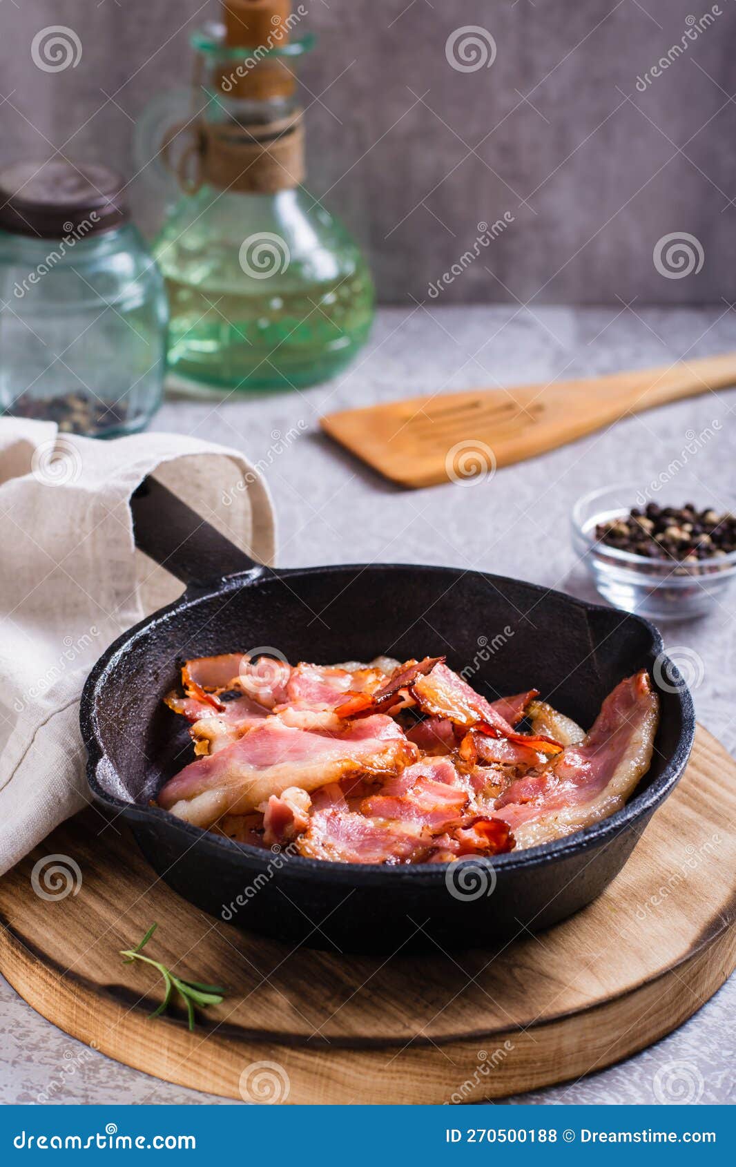 Fried Bacon in a Pan Ready for Dinner on the Table. Vertical View Stock ...