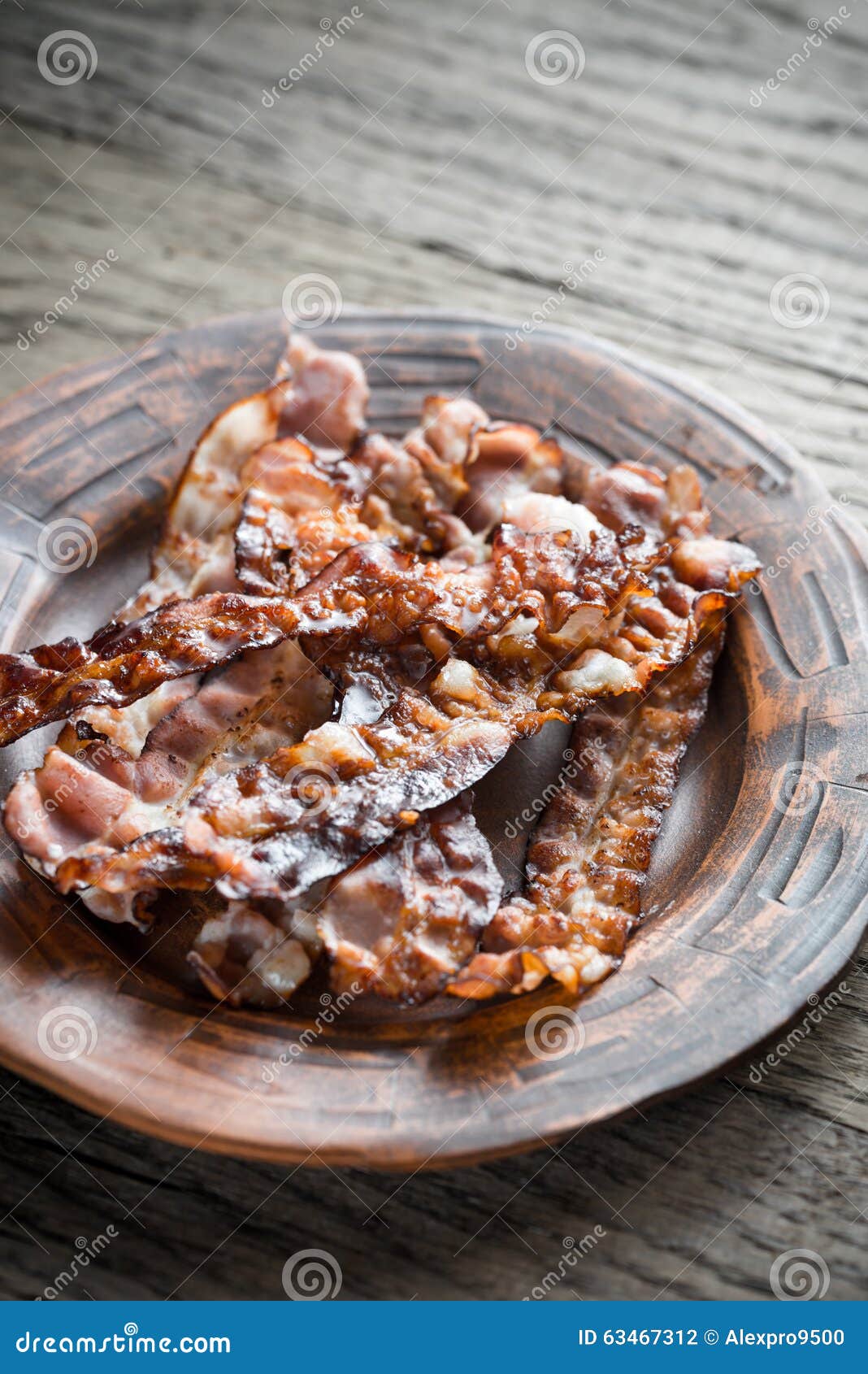 Fried Bacon Strips on the Plate Stock Photo - Image of stack, plate ...