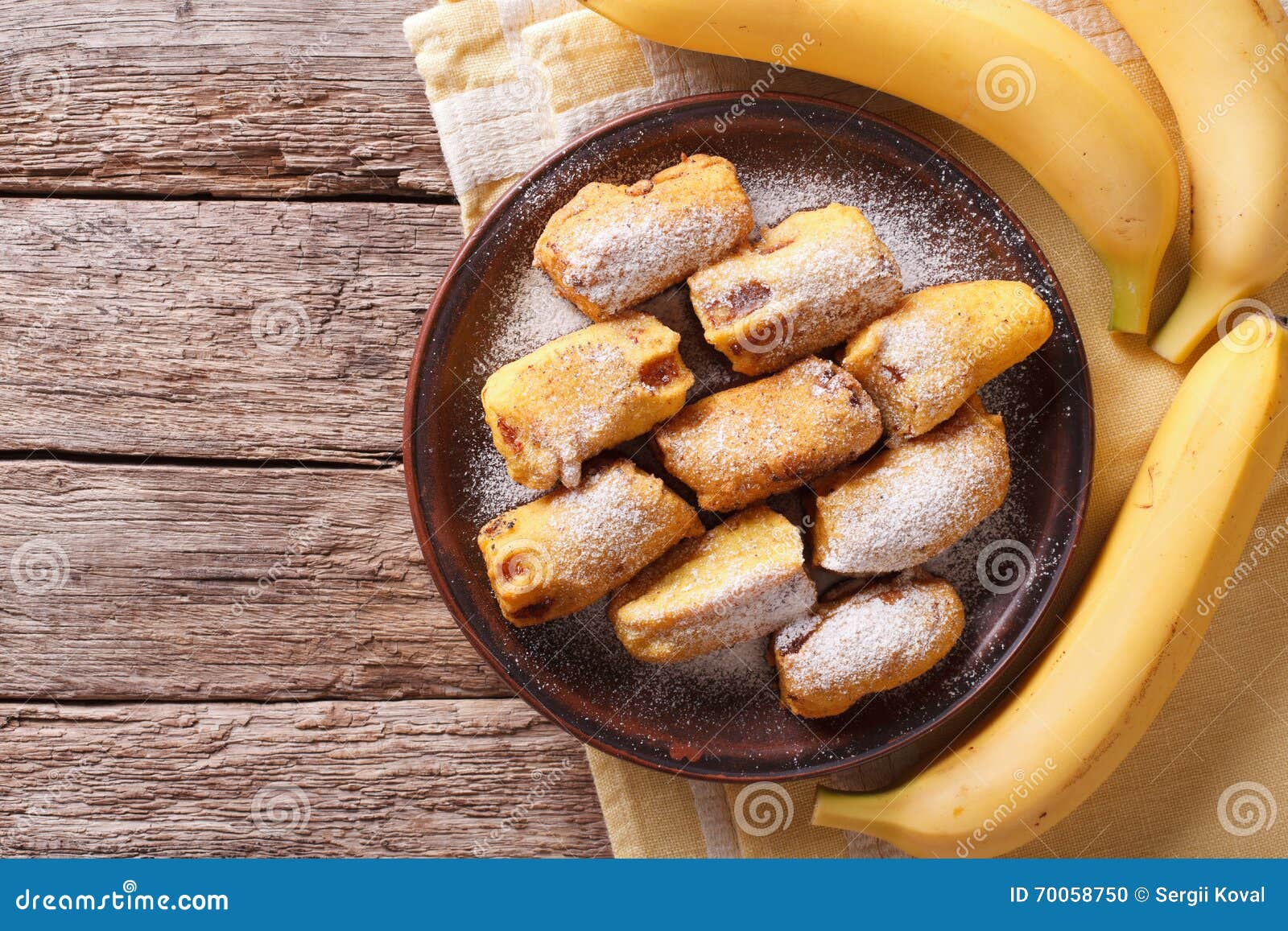 Fried Bananas in Batter on a Plate. Horizontal Top View Stock Photo ...
