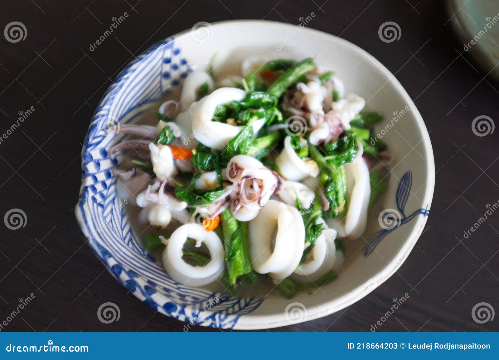 Fried Basil Leave with Squid in a White Bowl Stock Image - Image of ...
