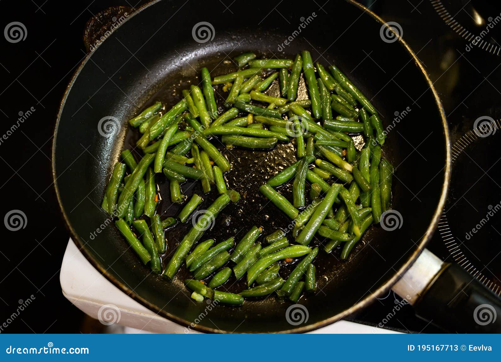 Fried beans in pods a pan. stock image. Image of organic - 195167713