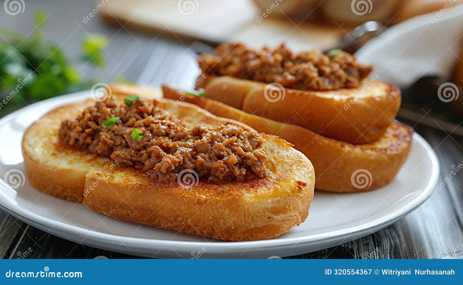 Fried Bread with Minced Pork Spread in a White Plate Placed on the ...