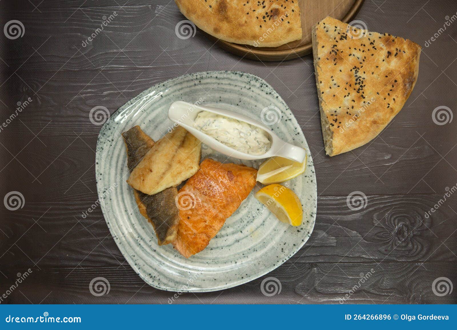 Fried Breaded Fish with White Sauce and Lemon Stock Photo - Image of ...