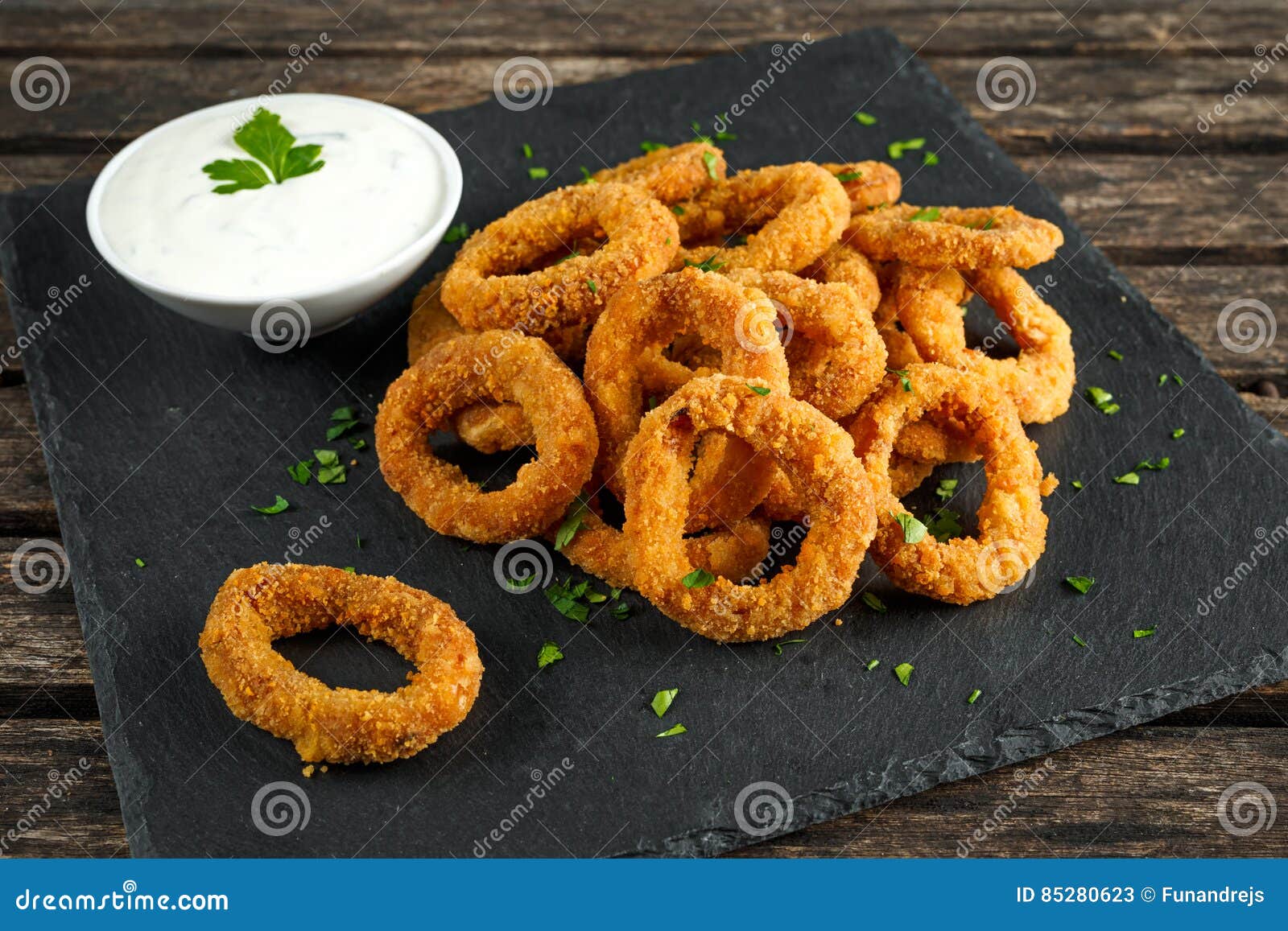 Fried Breaded Onion Rings with Sauce on Stone Board Stock Image - Image ...